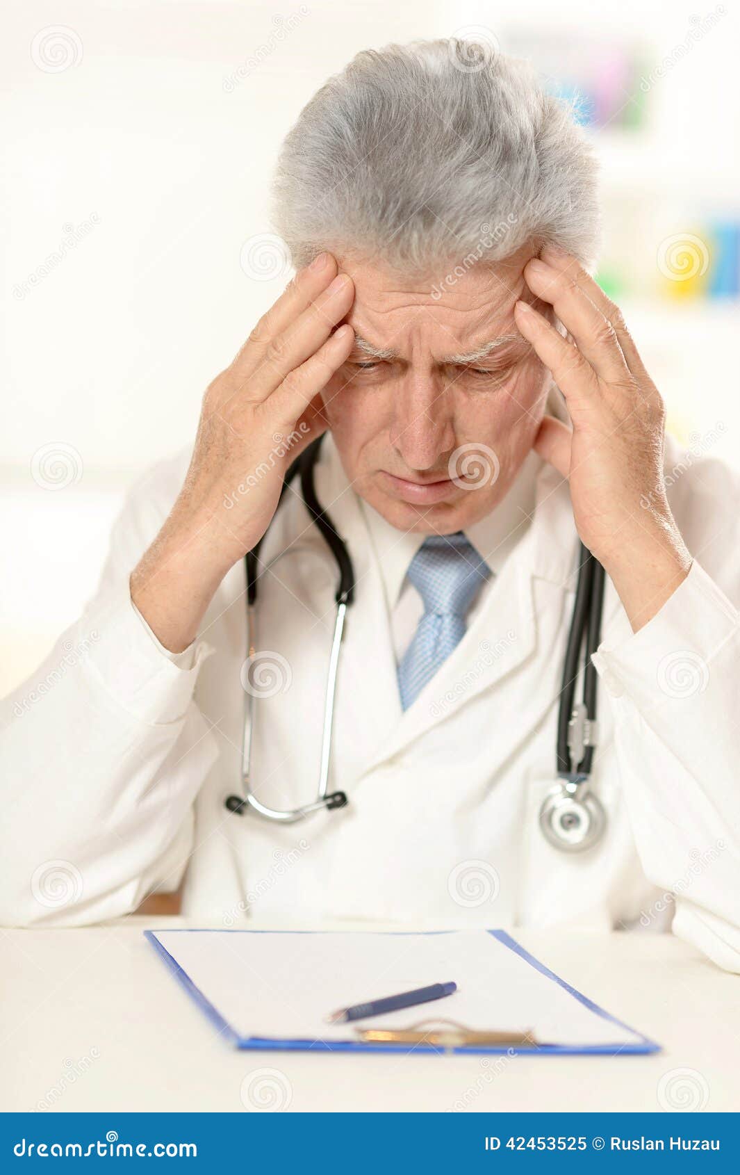 Sad senior doctor stock image. Image of documents, portrait - 42453525