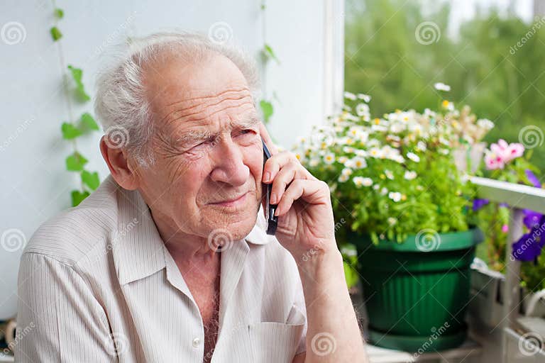 Sad Senior Man with Phone stock photo. Image of adult - 29603724