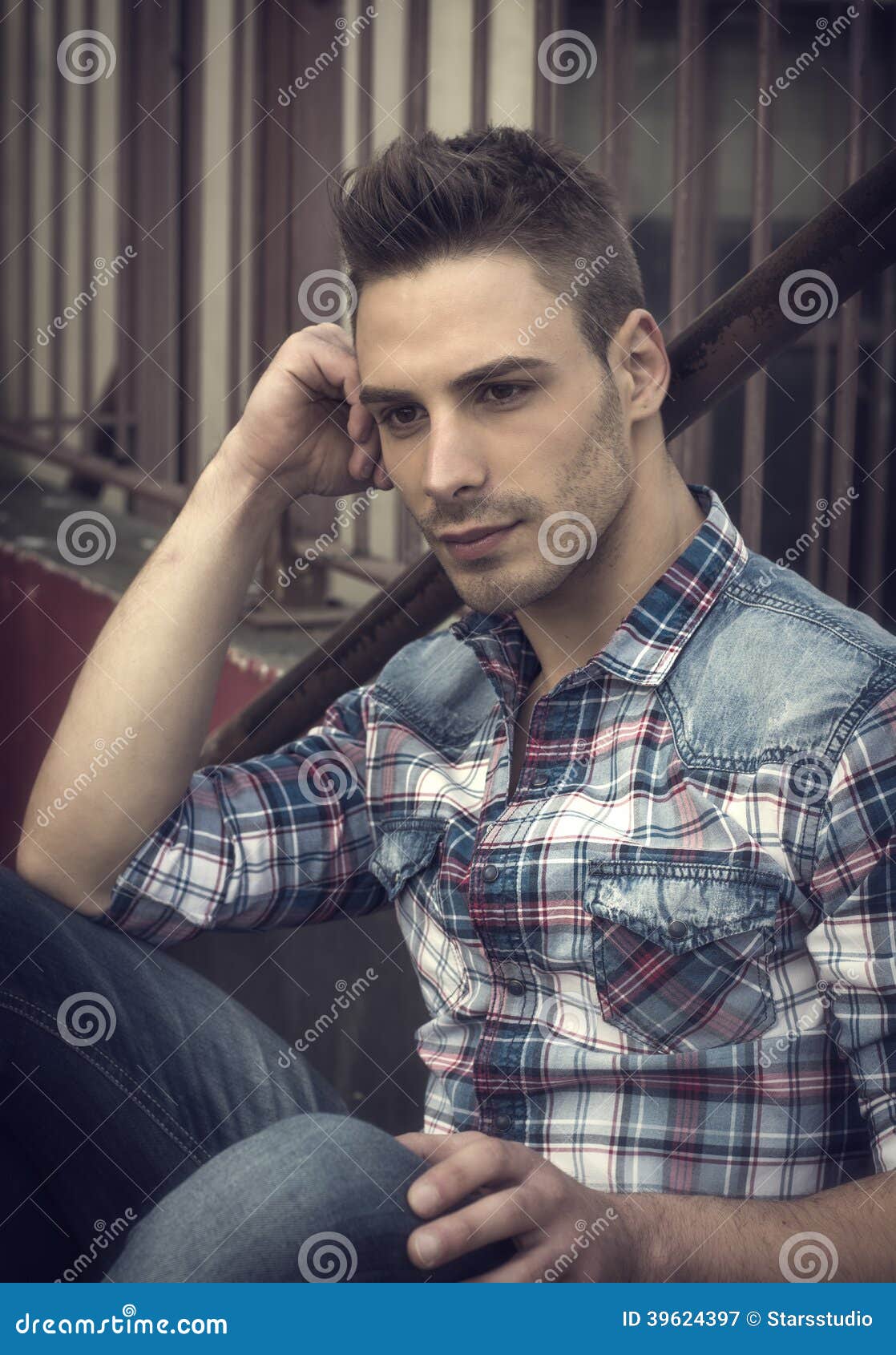 Sad, Serious Young Man Sitting and Looking Away Stock Image - Image of ...