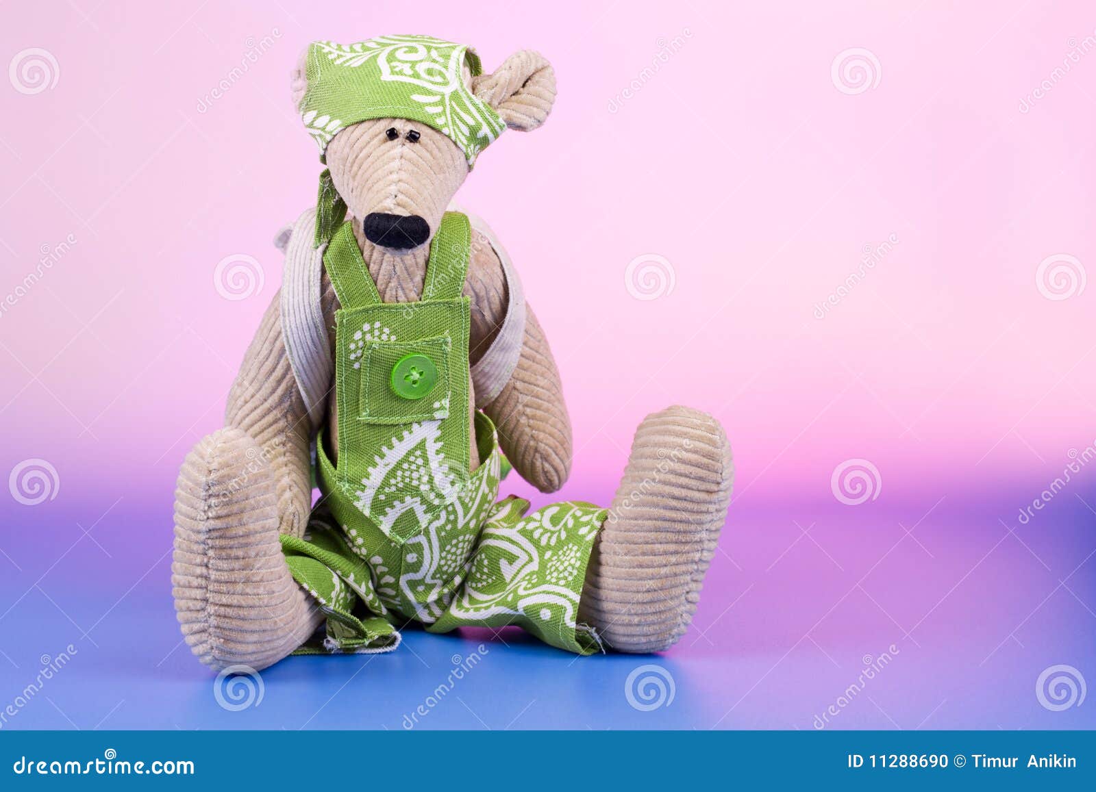 Sad Sitting Toy with Rucksack Stock Photo - Image of coverall, hand ...