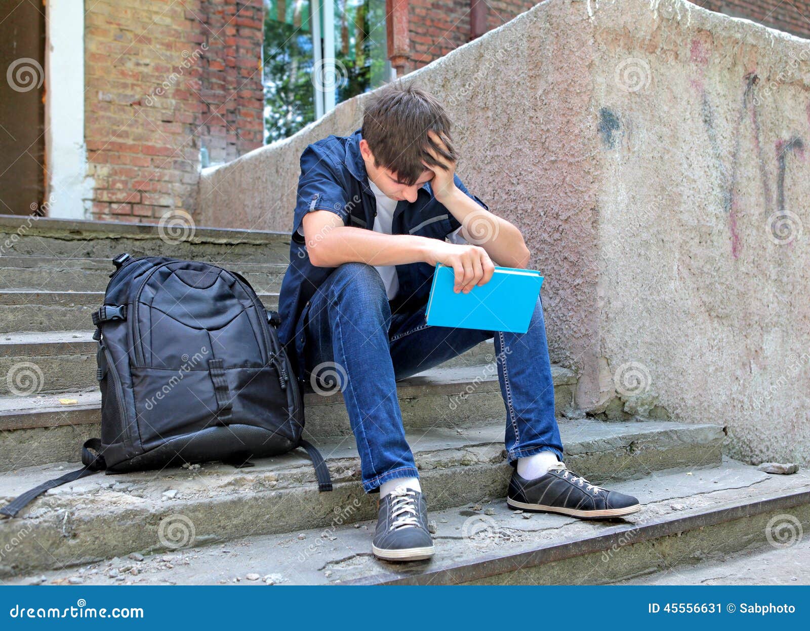 Sad Student with the Book stock image. Image of schoolhouse - 45556631