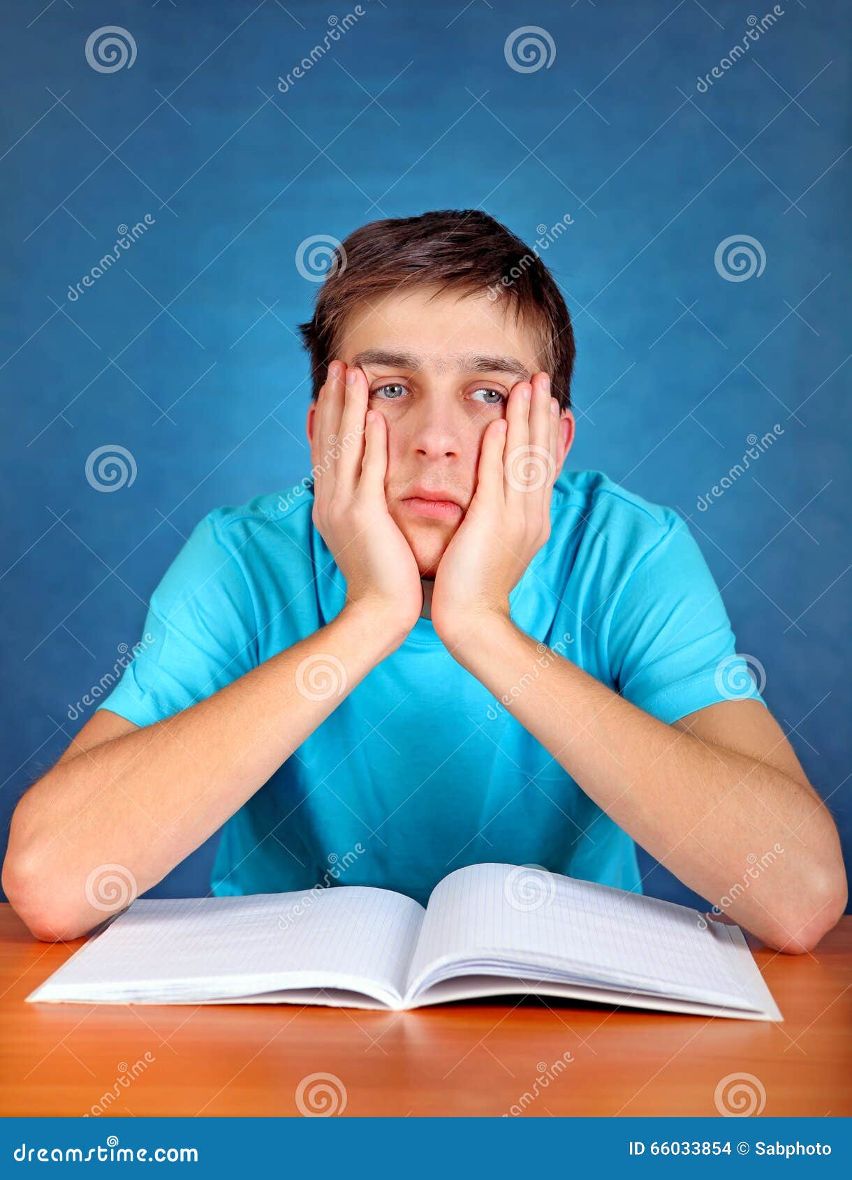 Sad Student with the Book stock photo. Image of learn - 66033854
