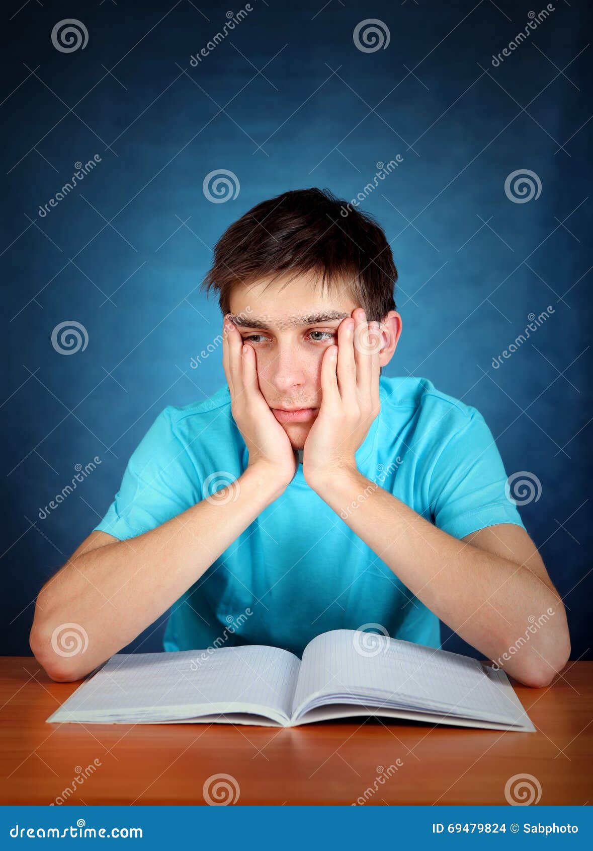 Sad Student with a Book stock photo. Image of stress - 69479824