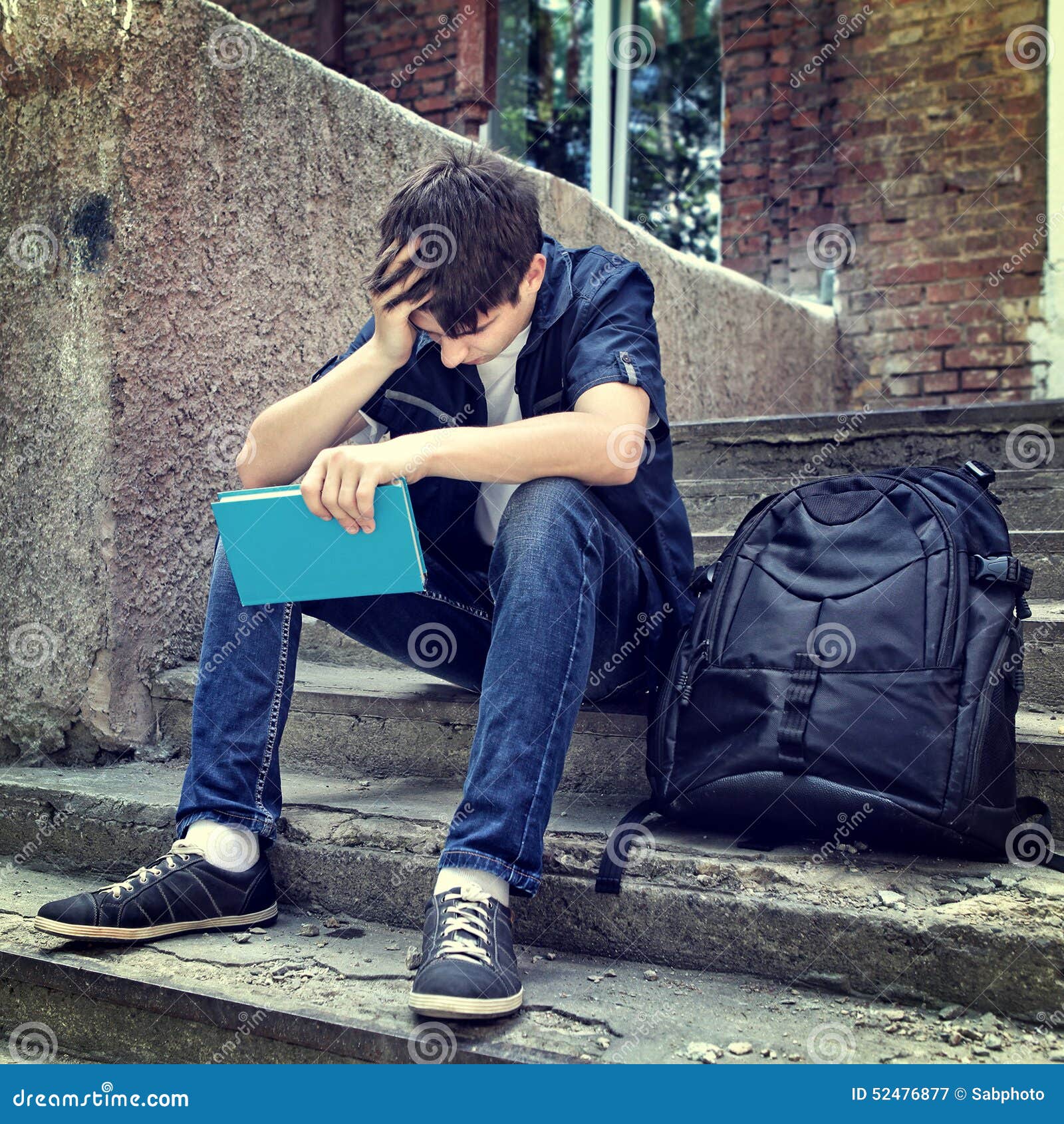 Sad Student with the Book stock image. Image of problem - 52476877