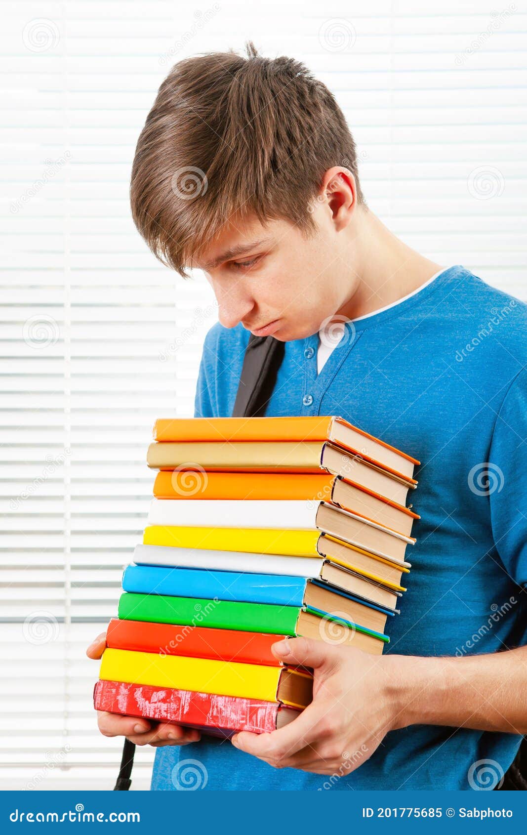 Sad Student with a Books stock image. Image of hold - 201775685