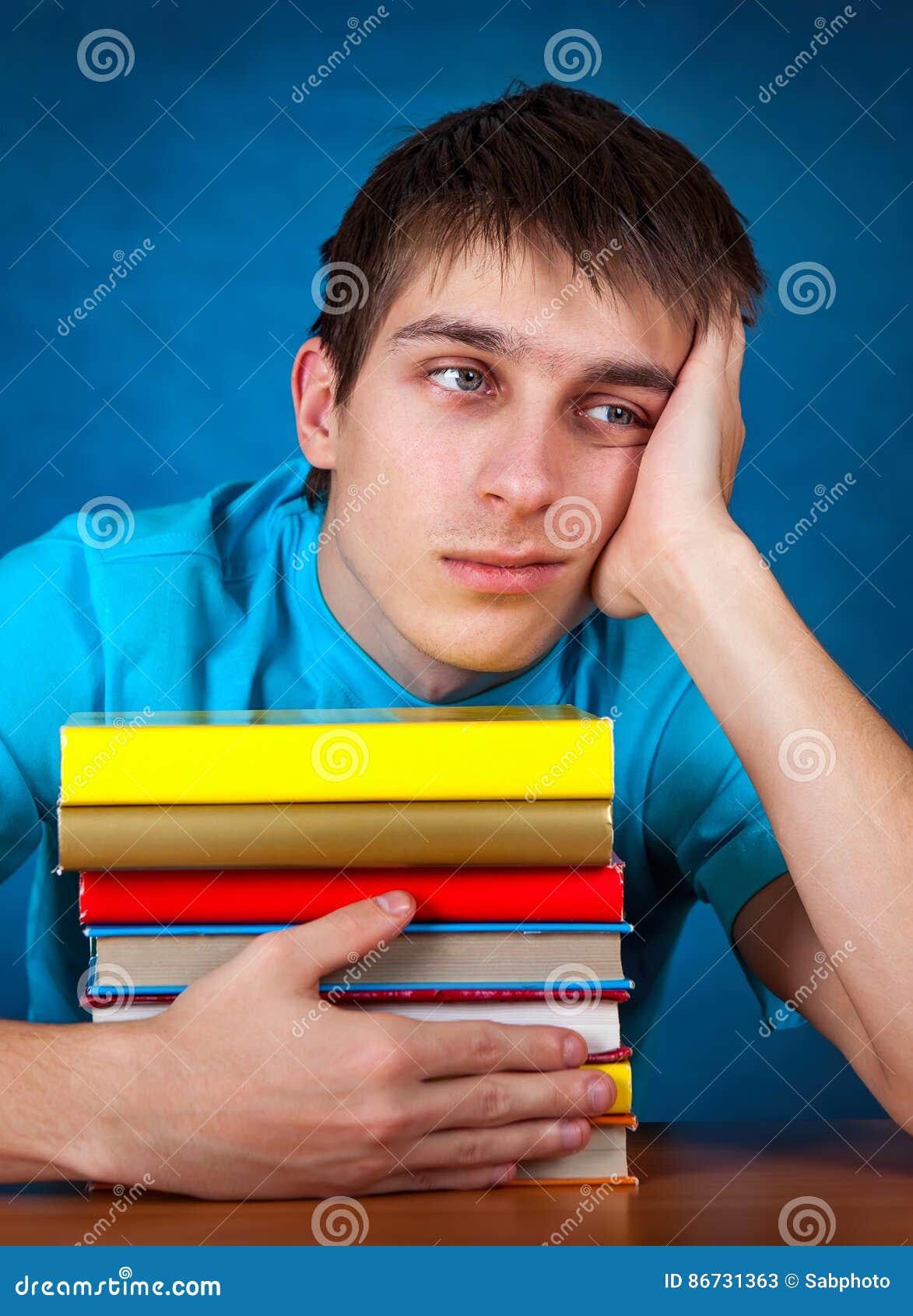 Sad Student with the Books stock image. Image of failure - 86731363
