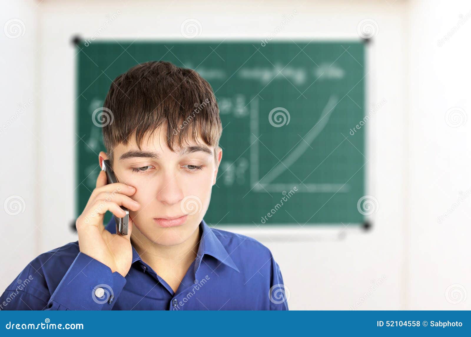 Sad Student with Cellphone stock photo. Image of closeup - 52104558