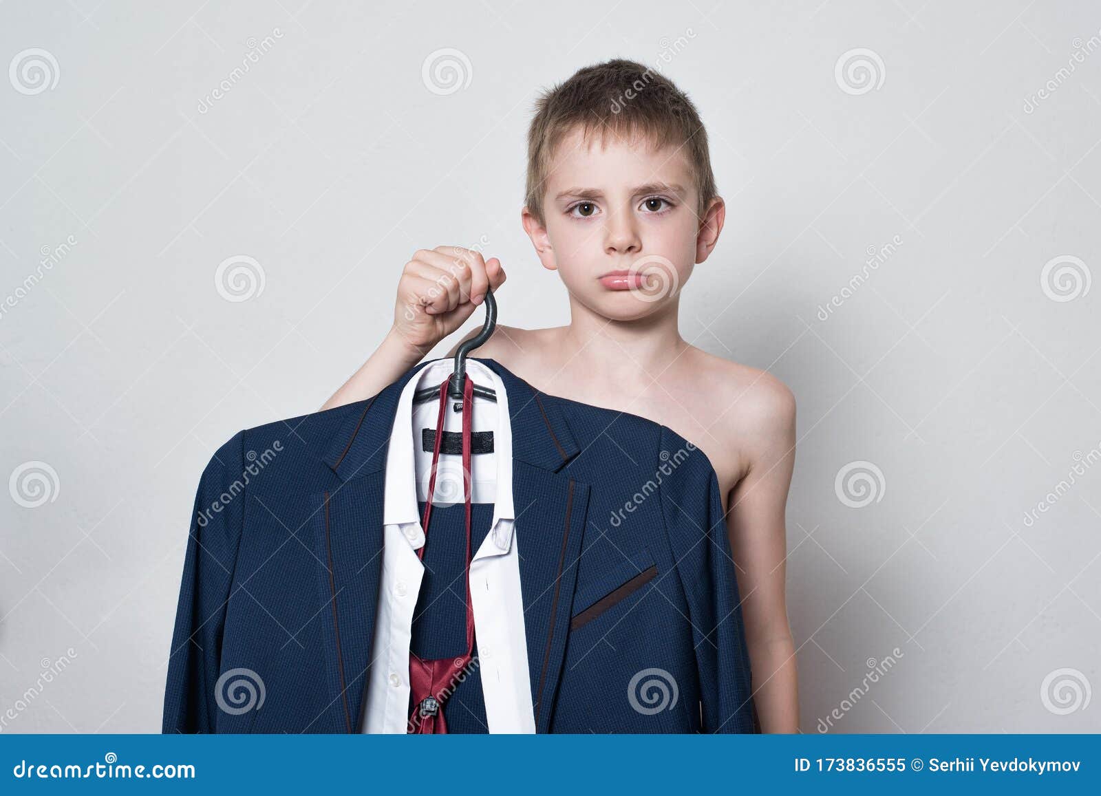 Sad Student Holds the School Uniform. Half-length Portrait on White ...