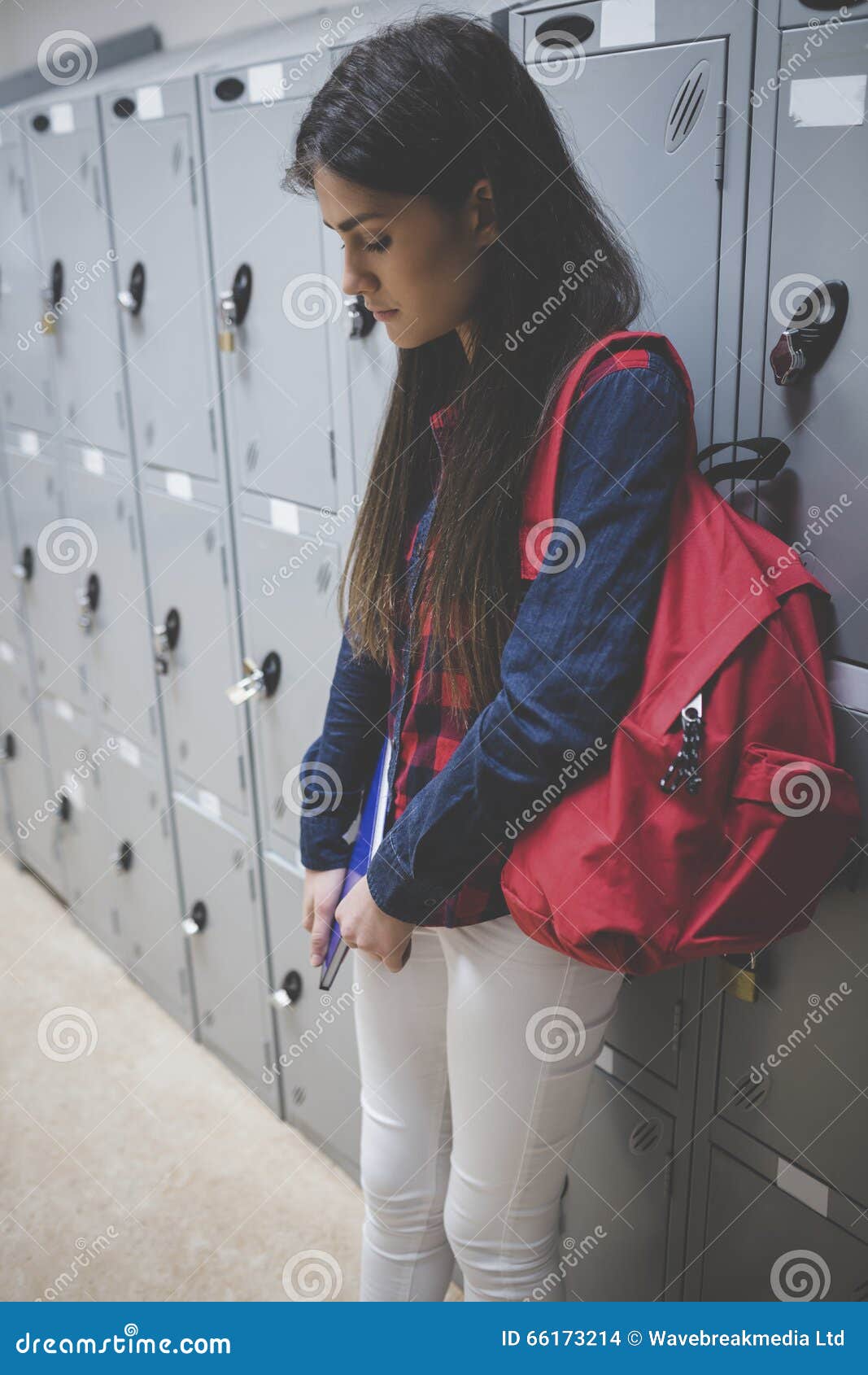 Sad Student Leaning on Locker Stock Photo - Image of adult, education ...