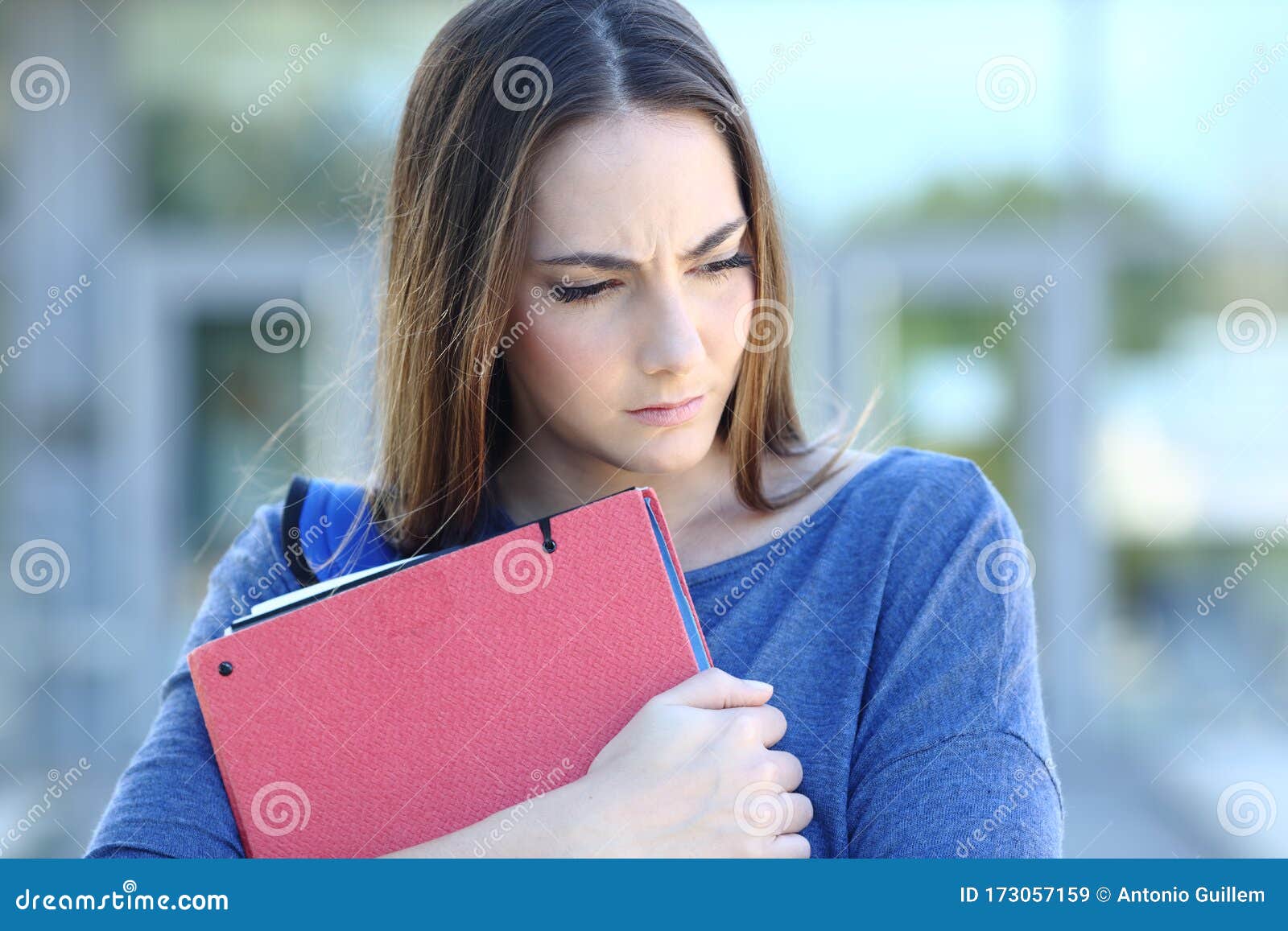 Sad Student Looking Down Walking in a College Stock Image - Image of ...