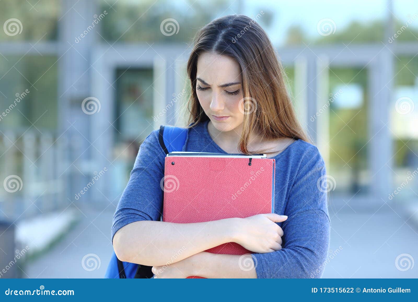 Sad Student Walking Looking Down in a Campus Stock Photo - Image of ...