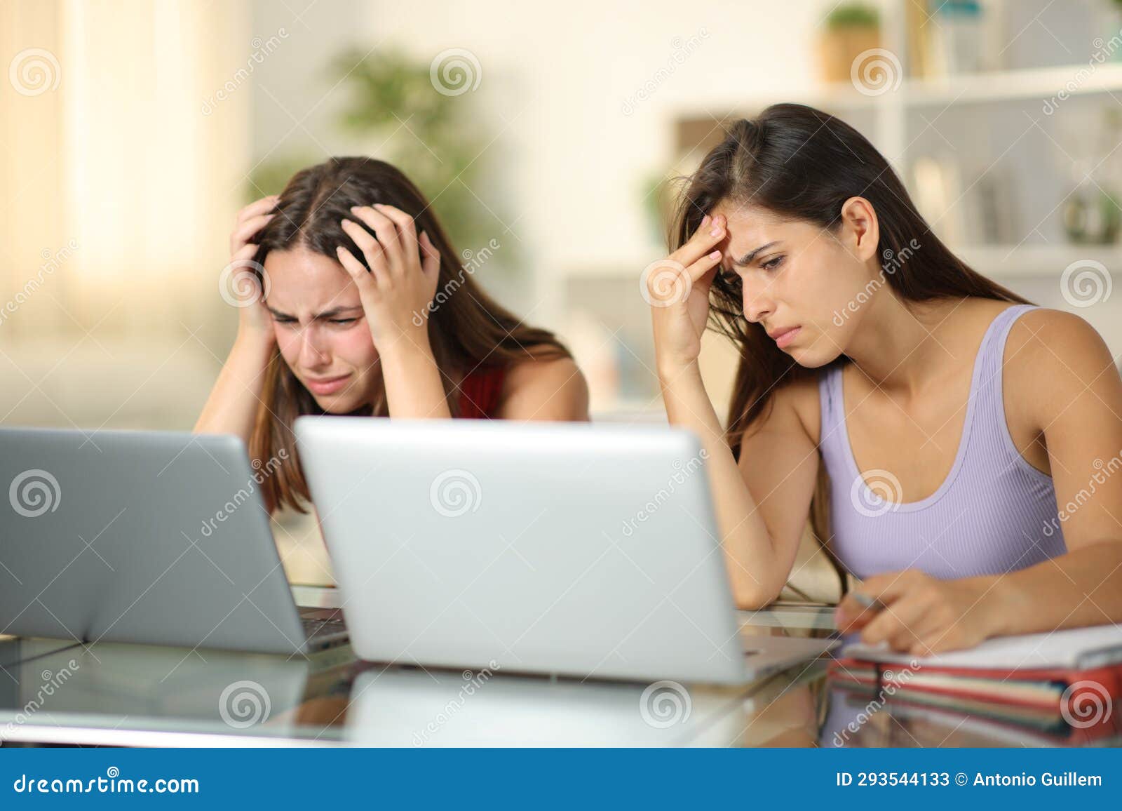 Sad Students Checking Grades on Laptops at Home Stock Image - Image of ...