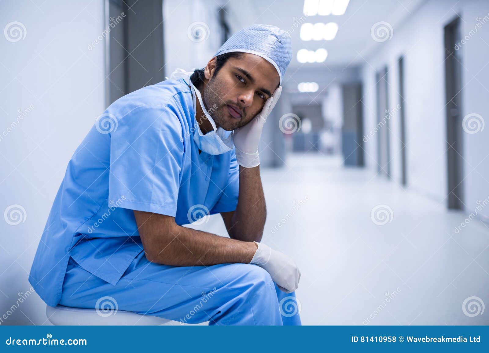 Sad Surgeon Sitting on a Chair Stock Photo - Image of corridor, sadness ... Sad Surgeon Sitting on a Chair Stock Photo - Image of corridor, sadness ...