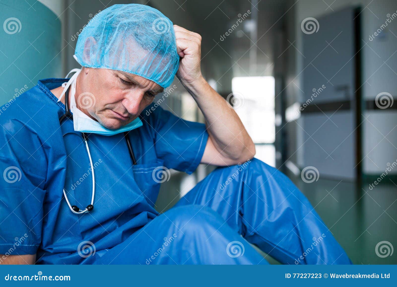 Sad Surgeon Sitting on Floor in Corridor Stock Image - Image of office ...