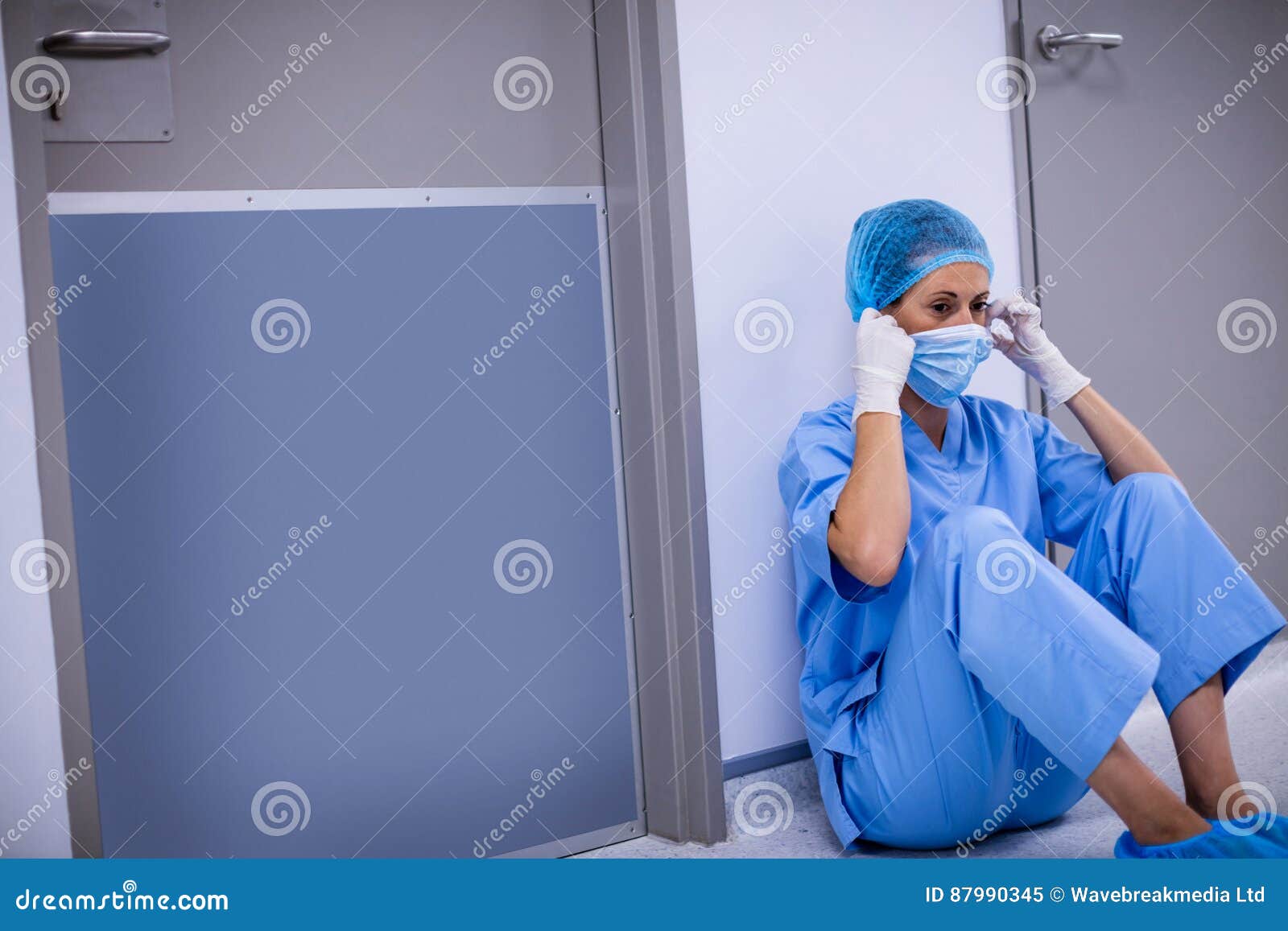 Sad Surgeon Sitting on Floor in Corridor Stock Image - Image of care ...