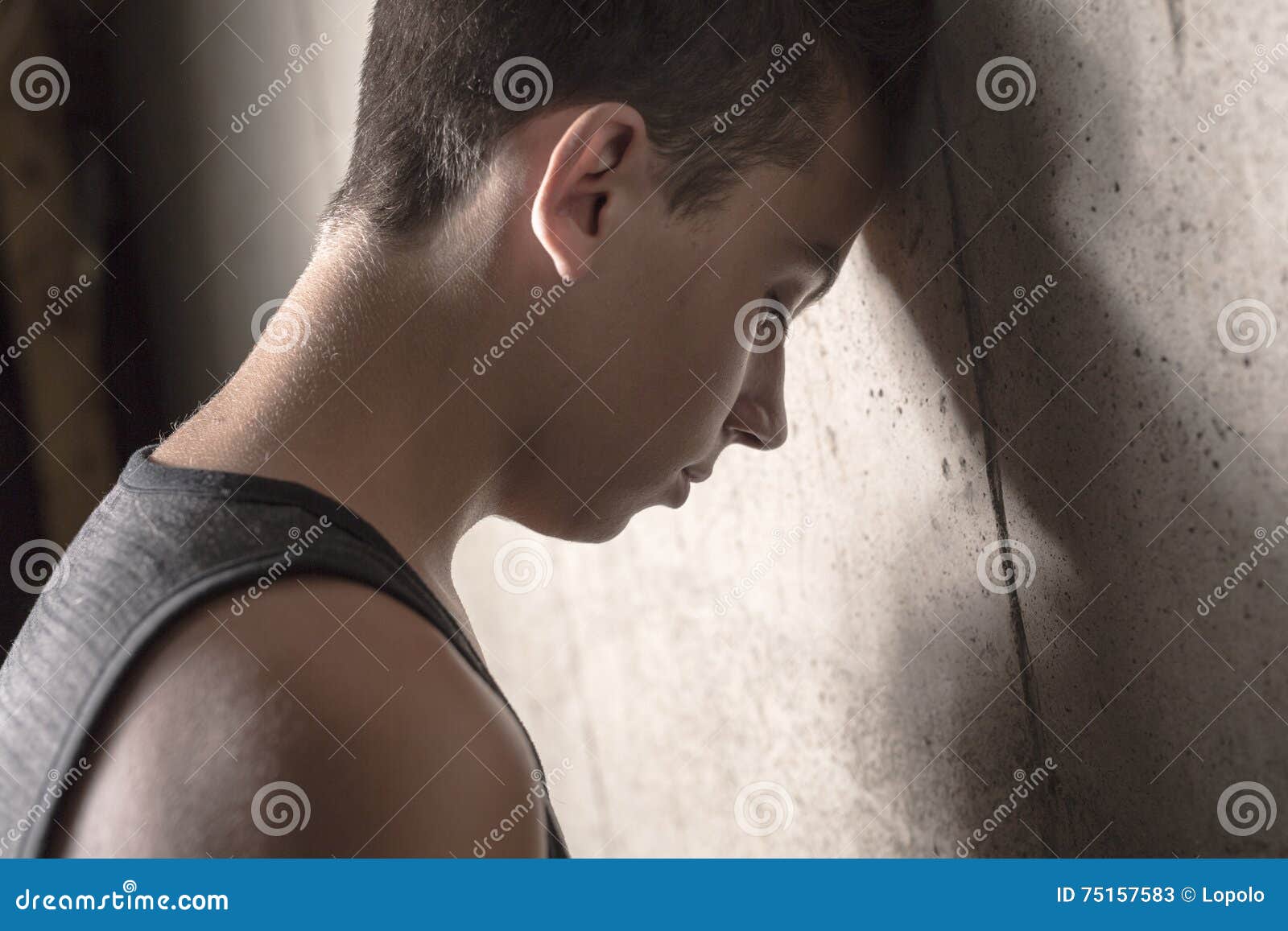 Sad teen boy concrete stock image. Image of loneliness - 75157583