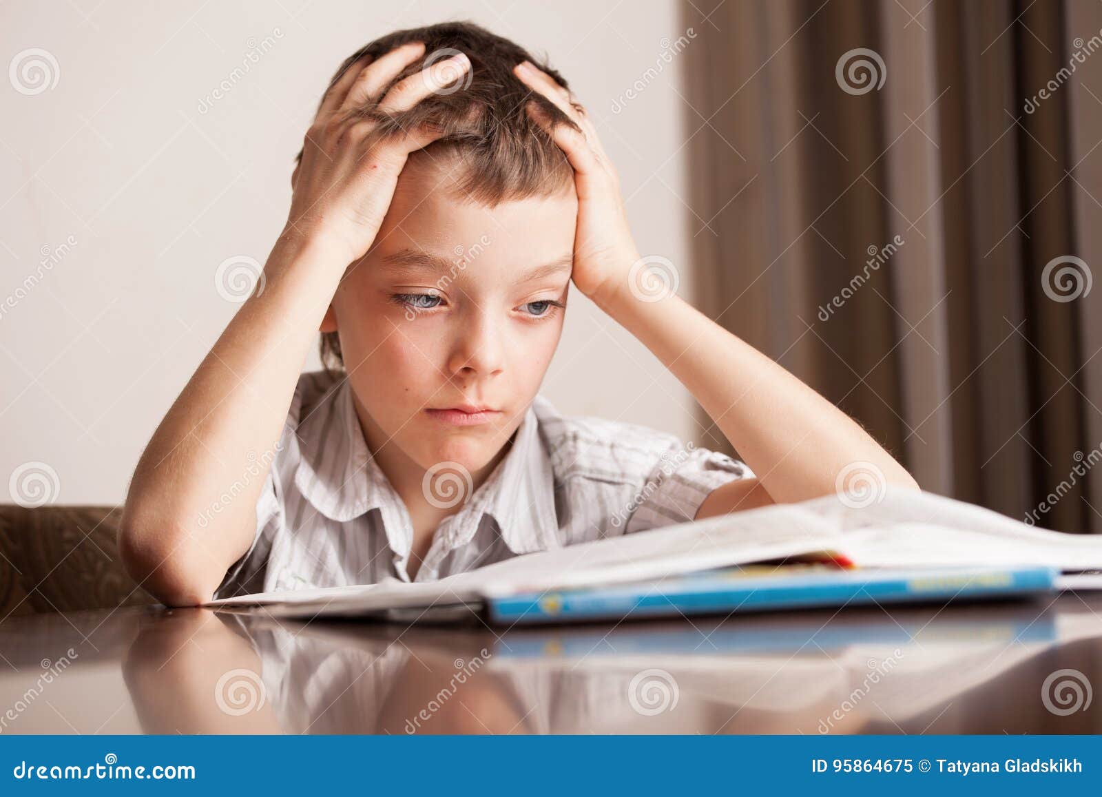 Sad teen doing homework stock image. Image of studying - 95864675