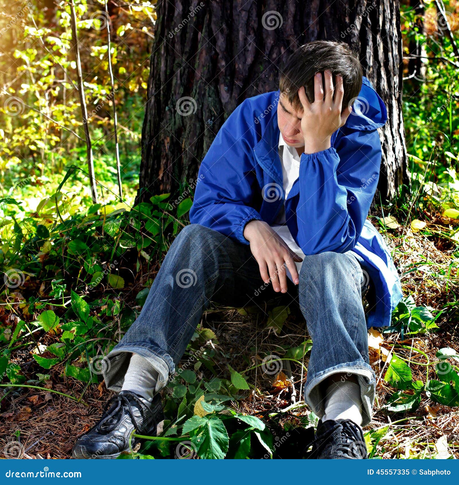 Sad Teenager in the Forest stock image. Image of depression - 45557335