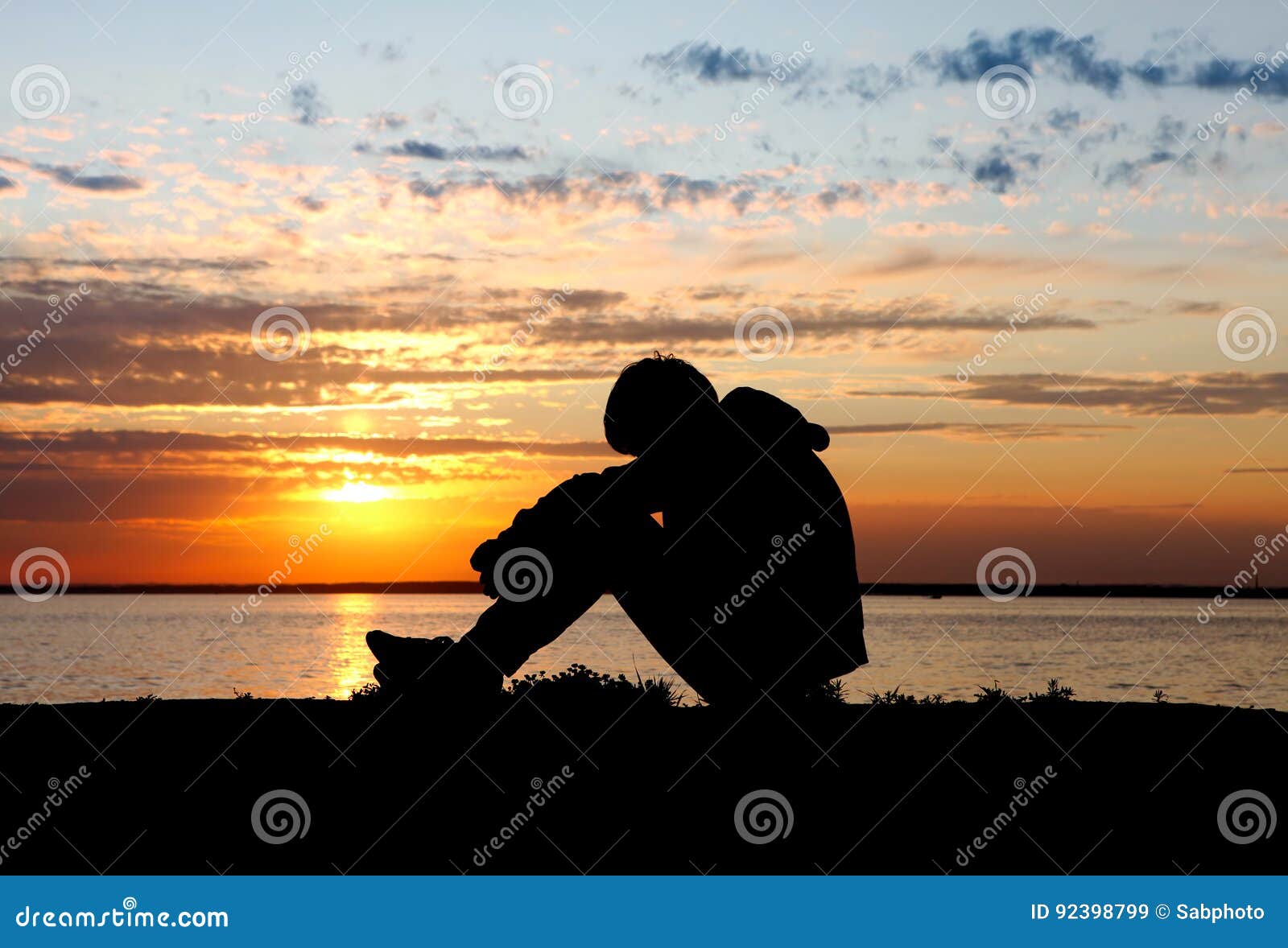 Sad Teenager at Sunset stock image. Image of rural, person - 92398799