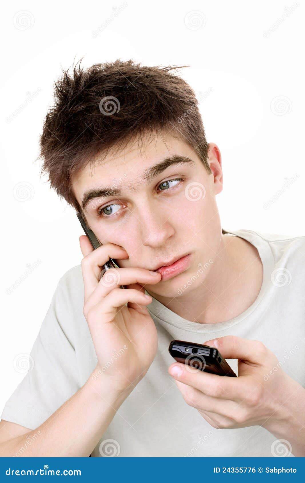 Sad Teenager with Two Phones Stock Photo - Image of mobile, cute: 24355776