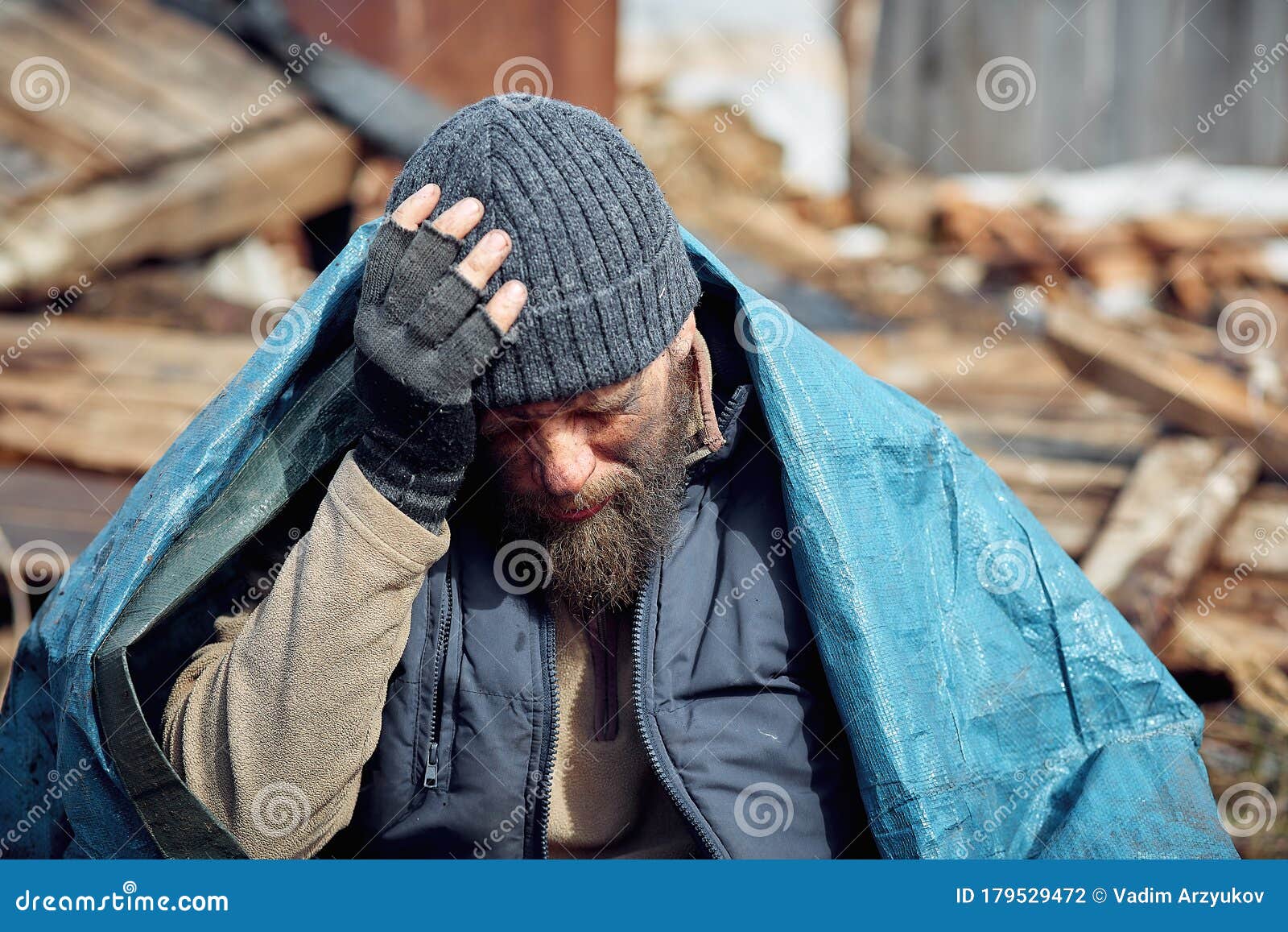Sad and Upset Homeless and Unemployed Man in the Ruins Stock Photo ...