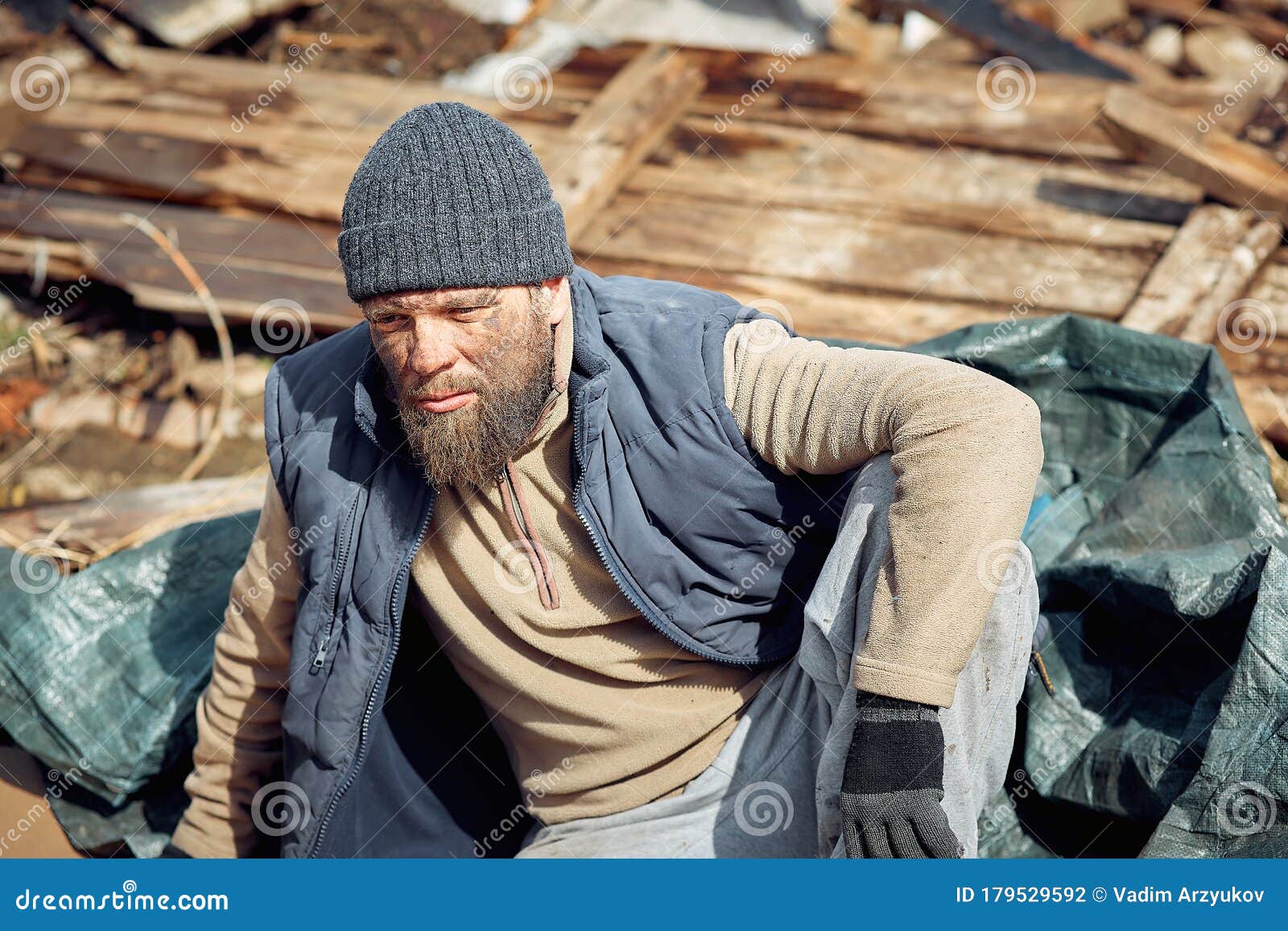 Sad and Upset Homeless and Unemployed Man in the Ruins Stock Photo ...