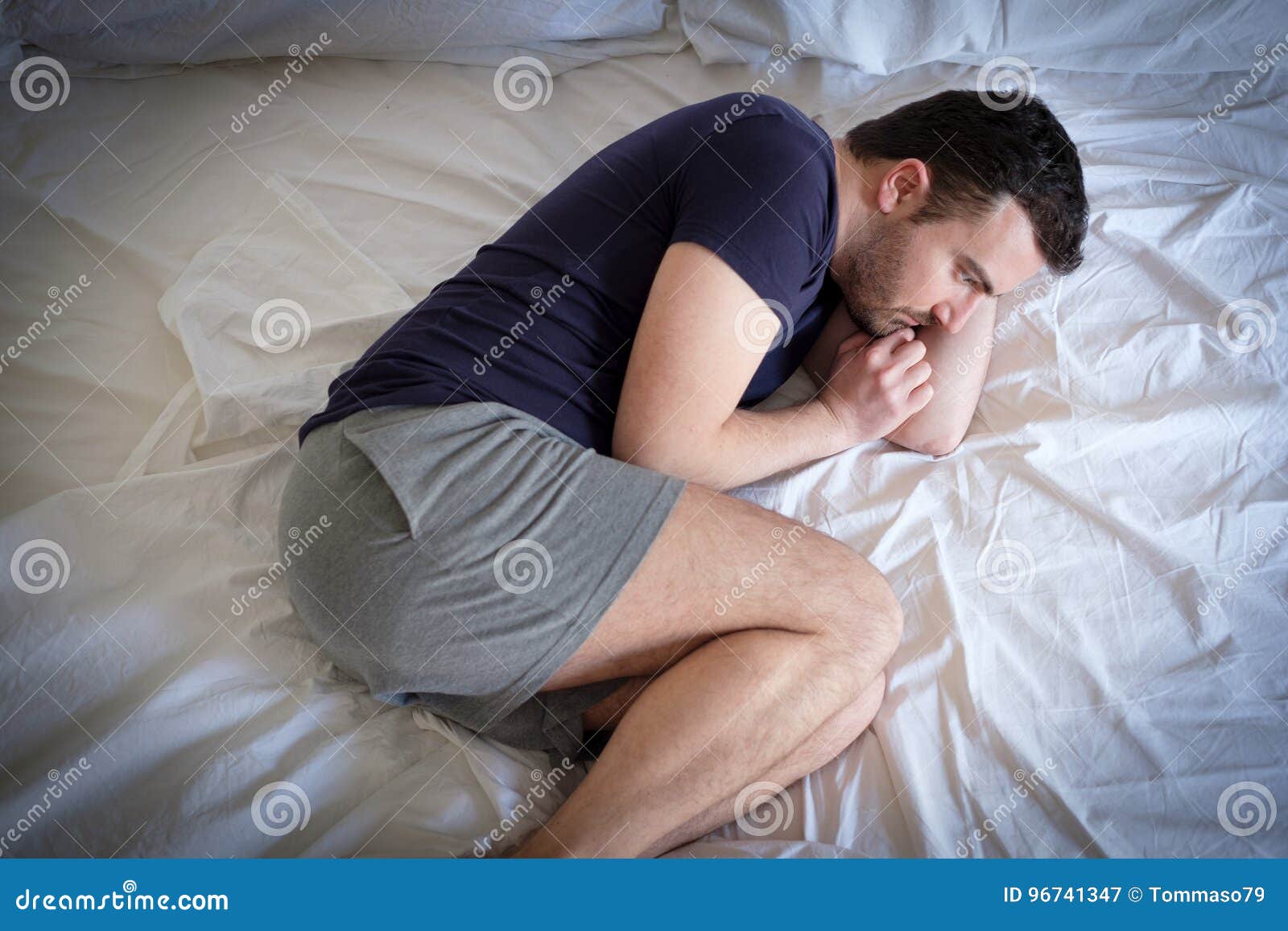 Sad and Upset Man Trying To Sleep in Bed Stock Image - Image of ...