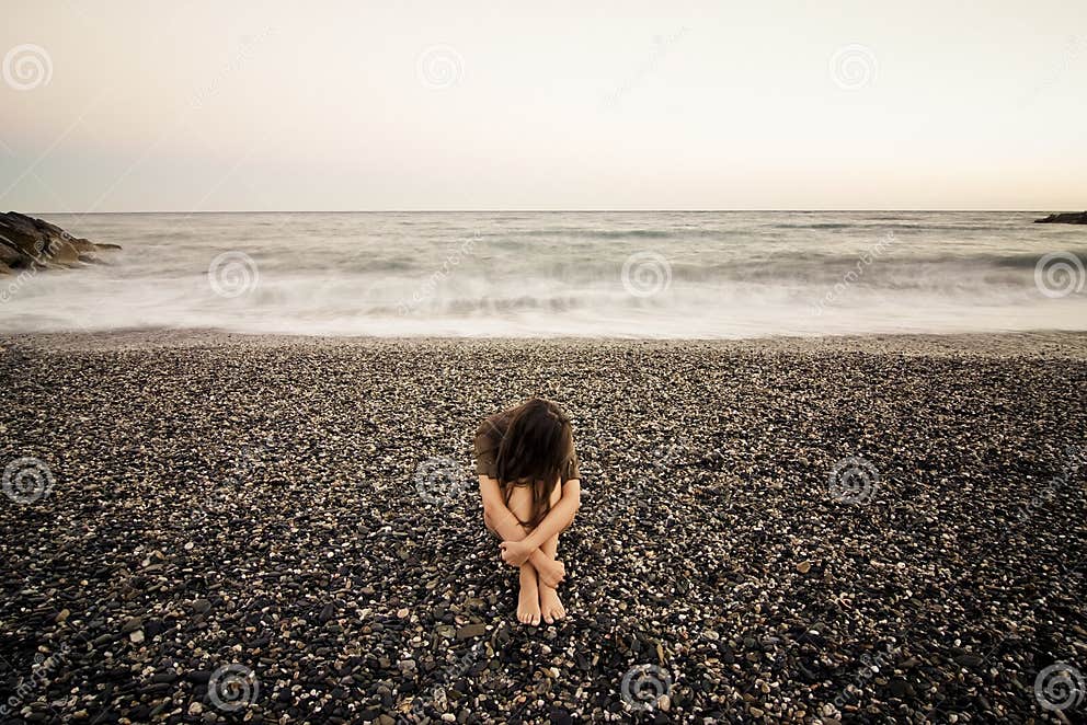 Sad woman on the beach stock image. Image of angle, exposure - 5937189