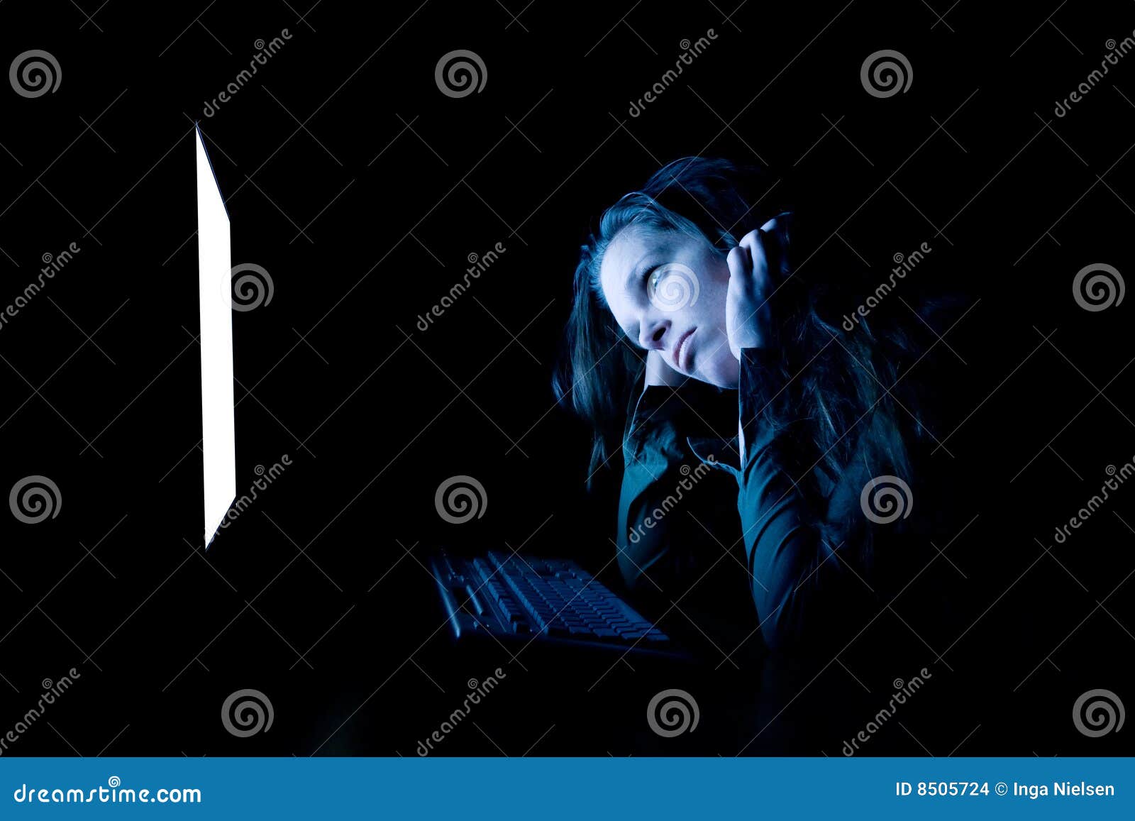 Sad woman on computer stock photo. Image of seriously - 8505724