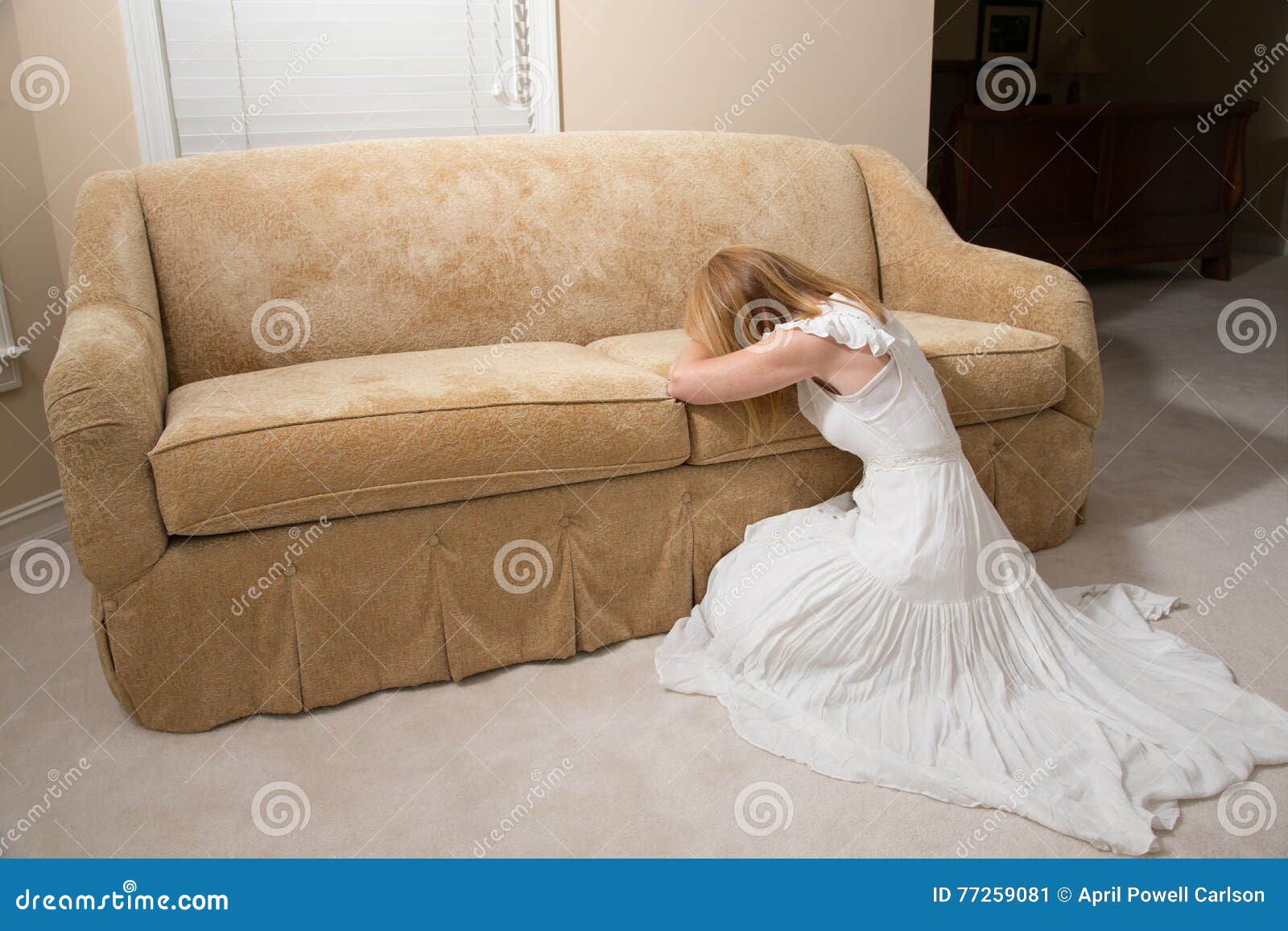 Sad woman crying on couch stock image. Image of stricken - 77259081