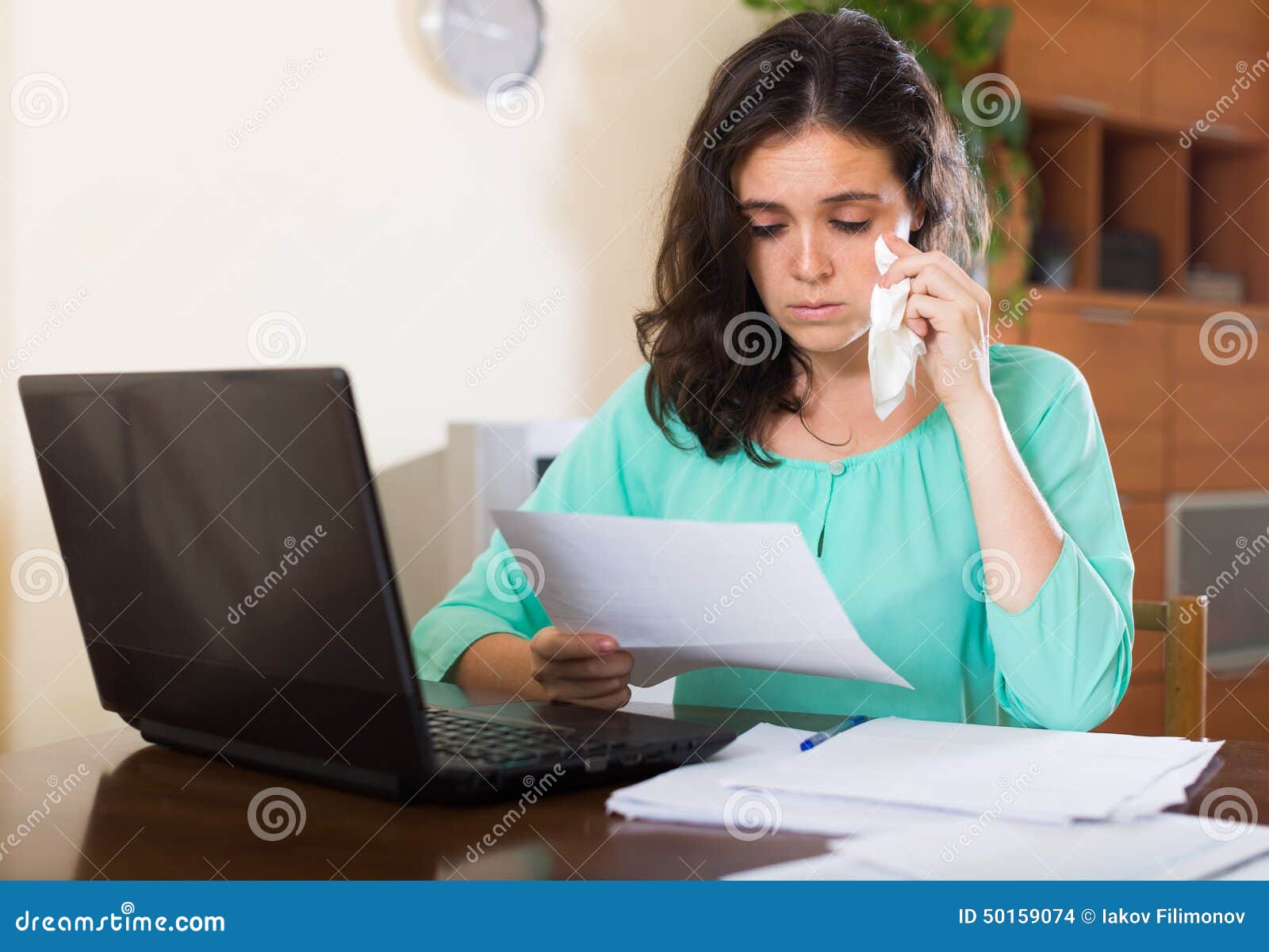 Sad Woman with Documents and Laptop Stock Photo - Image of internet ...