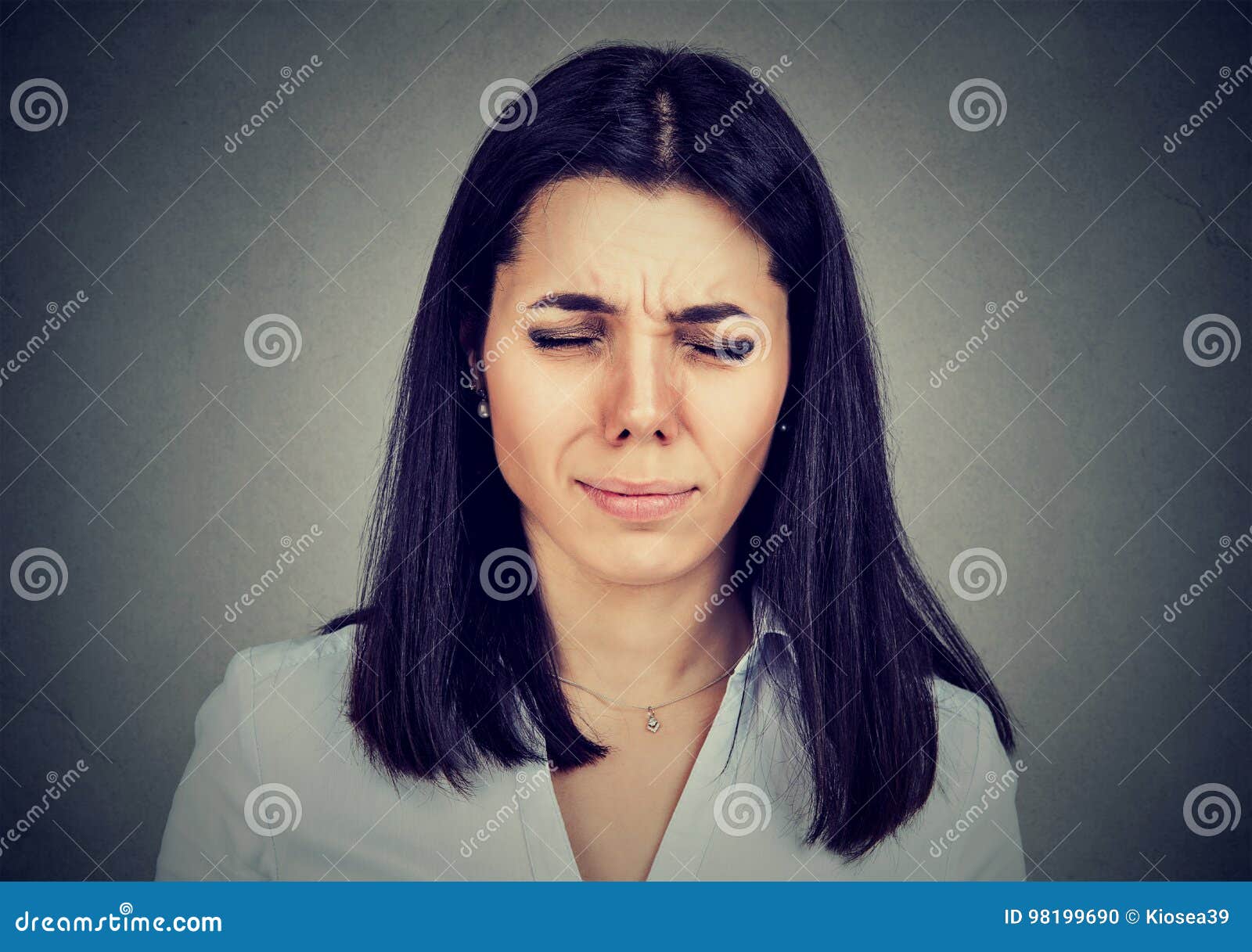 Sad Woman On Gray Wall Background Stock Photo - Image of breakup ...