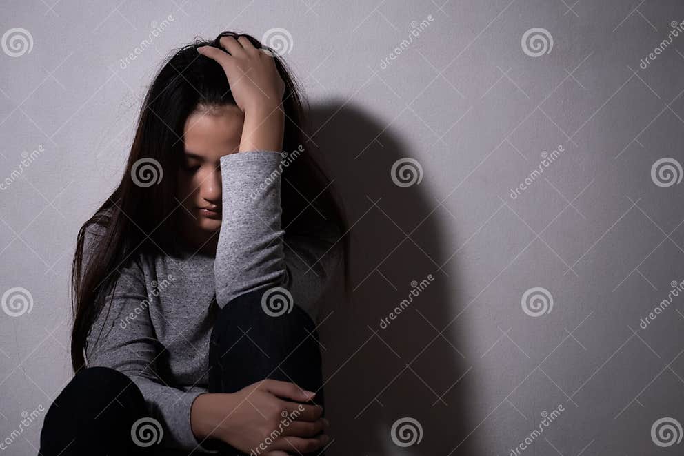 Sad Woman Hug Her Knee And Cry Sad Woman Sitting Alone In A Empty Room