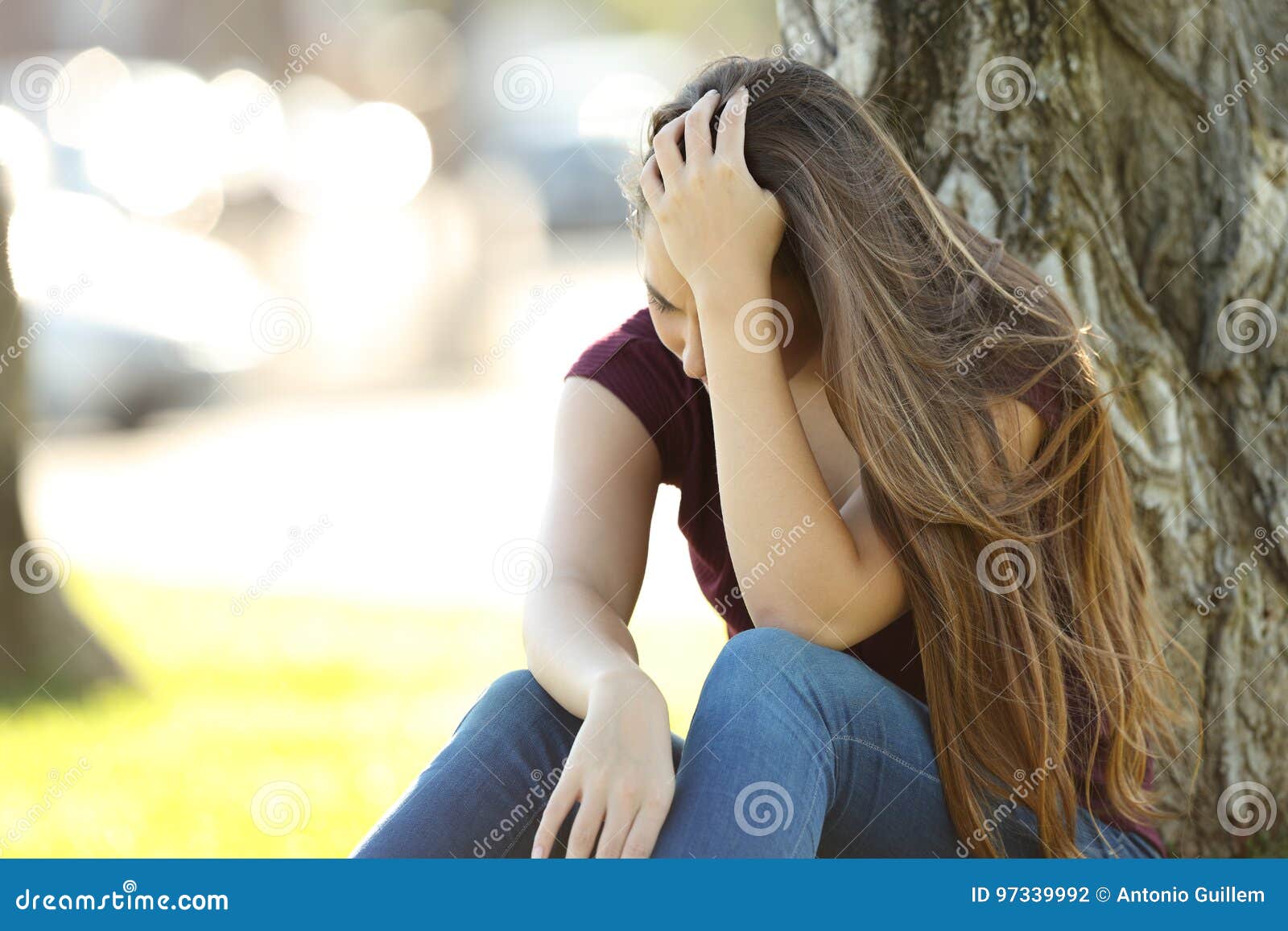 Sad Woman Lamenting Sitting in a Park Stock Photo - Image of depressed ...