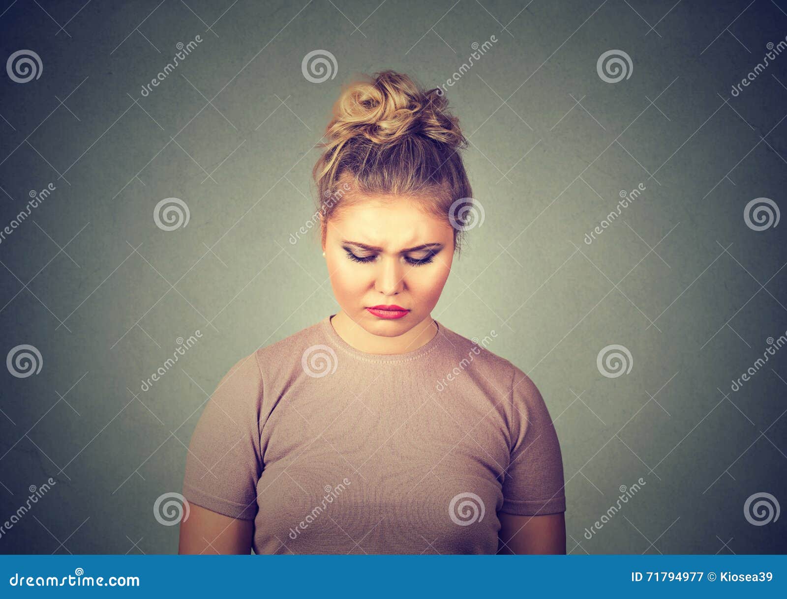 Sad woman looking down stock image. Image of problems - 71794977