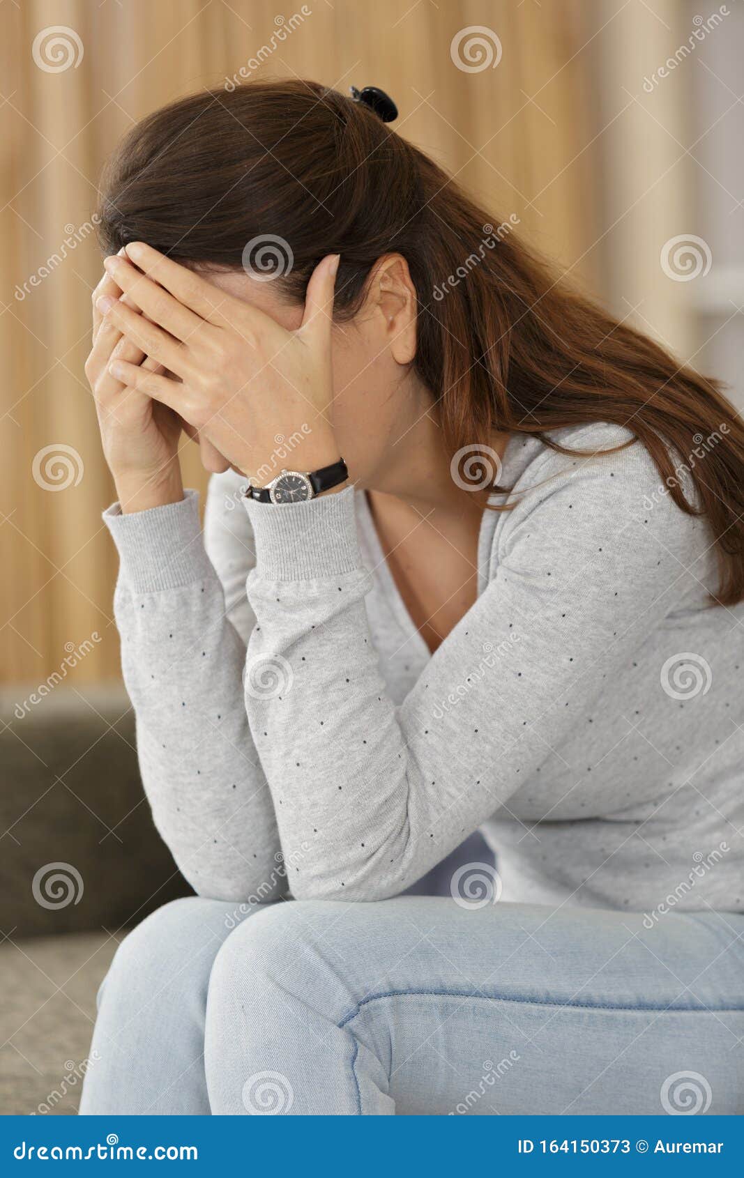 Sad woman looking down stock image. Image of dreariness - 164150373