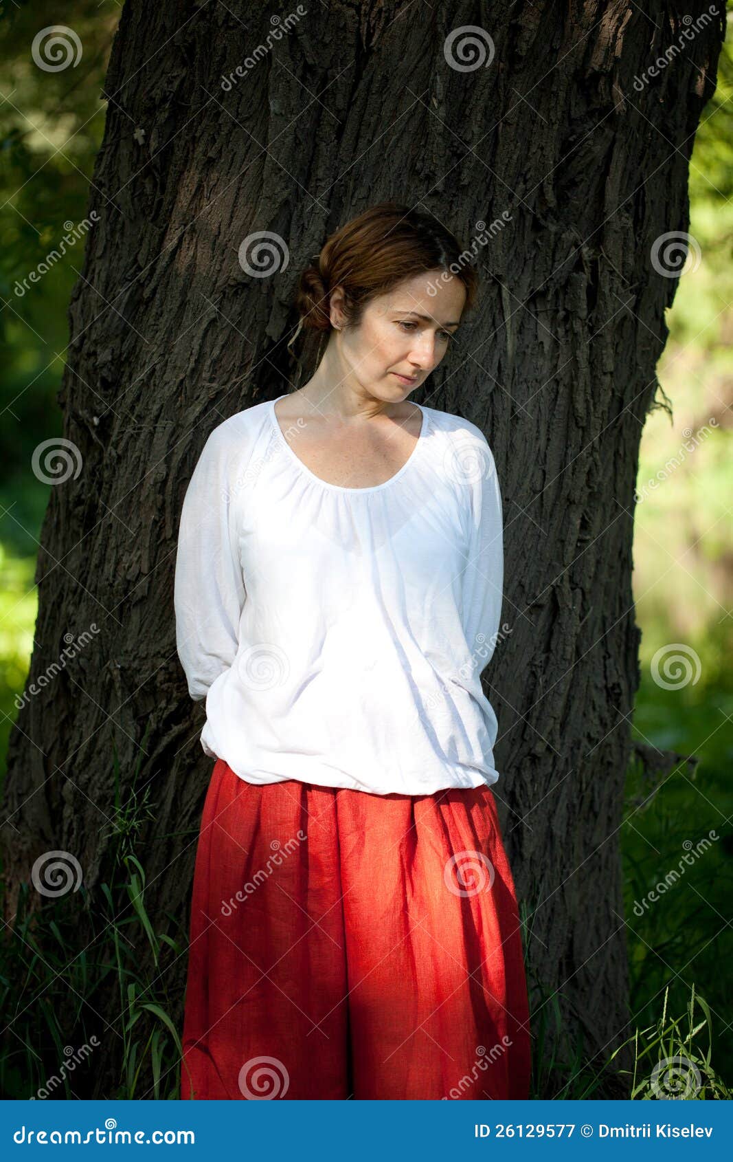 Sad woman in red sarafan stock image. Image of beautiful - 26129577