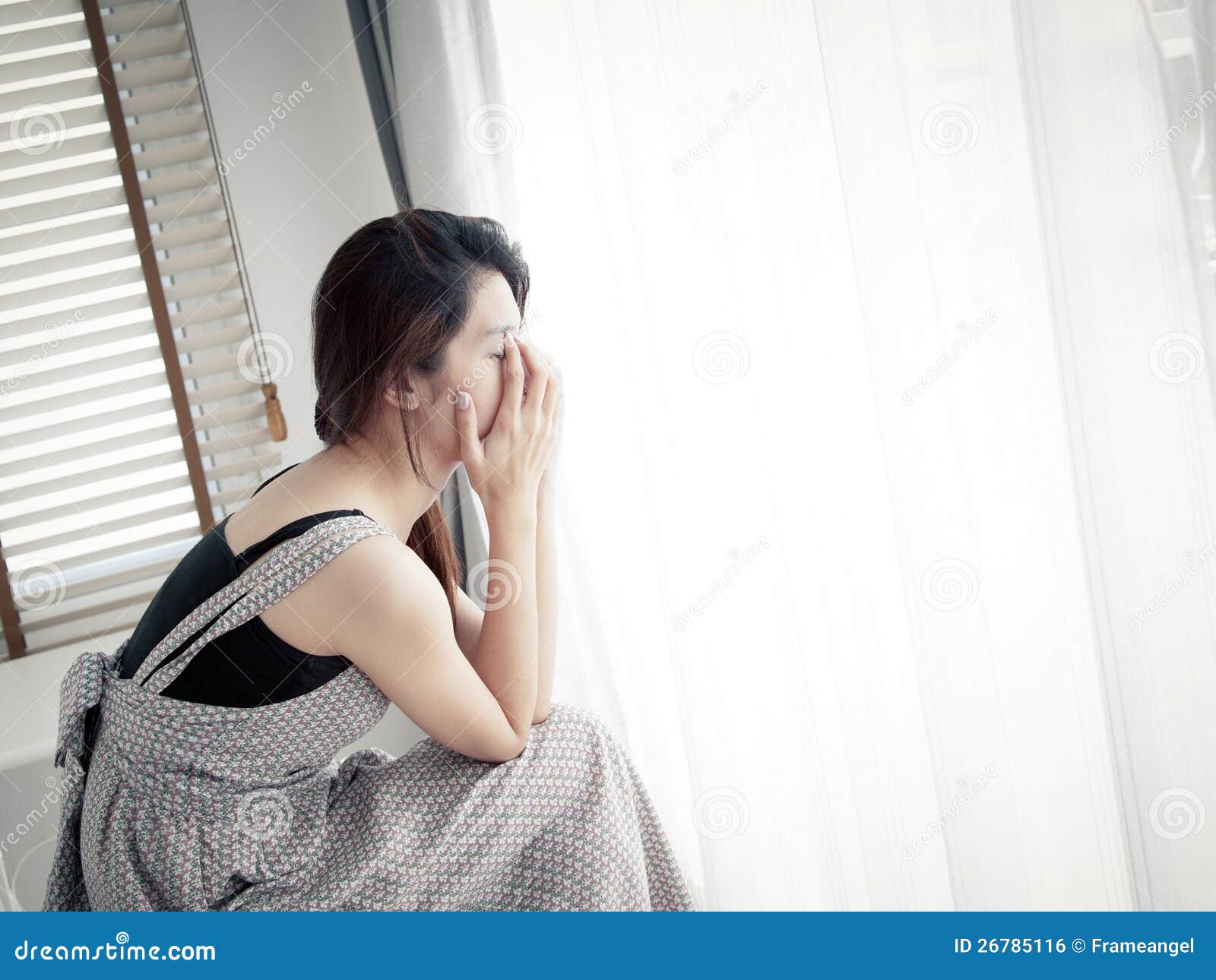 Sad Woman Sitting Alone in Room Stock Photo - Image of guilt, lost ...