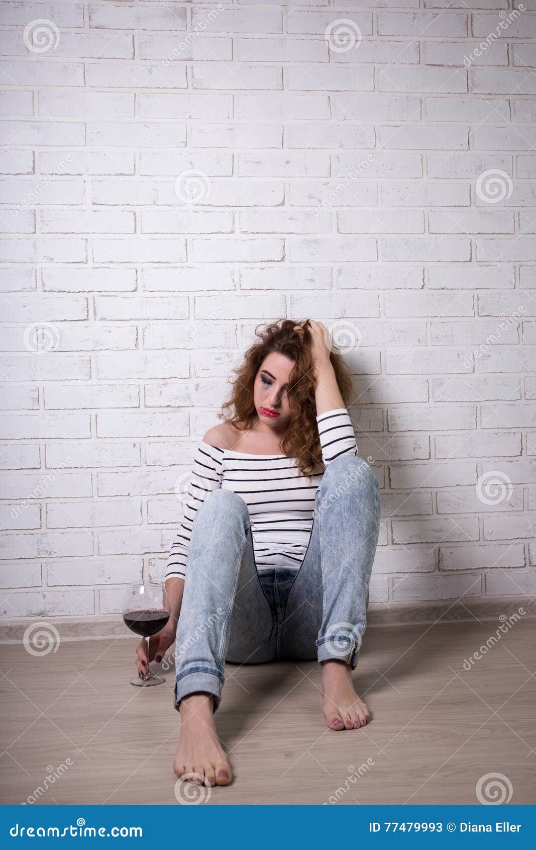 Sad Woman Sitting on the Floor, Crying and Drinking Wine Stock Image ...