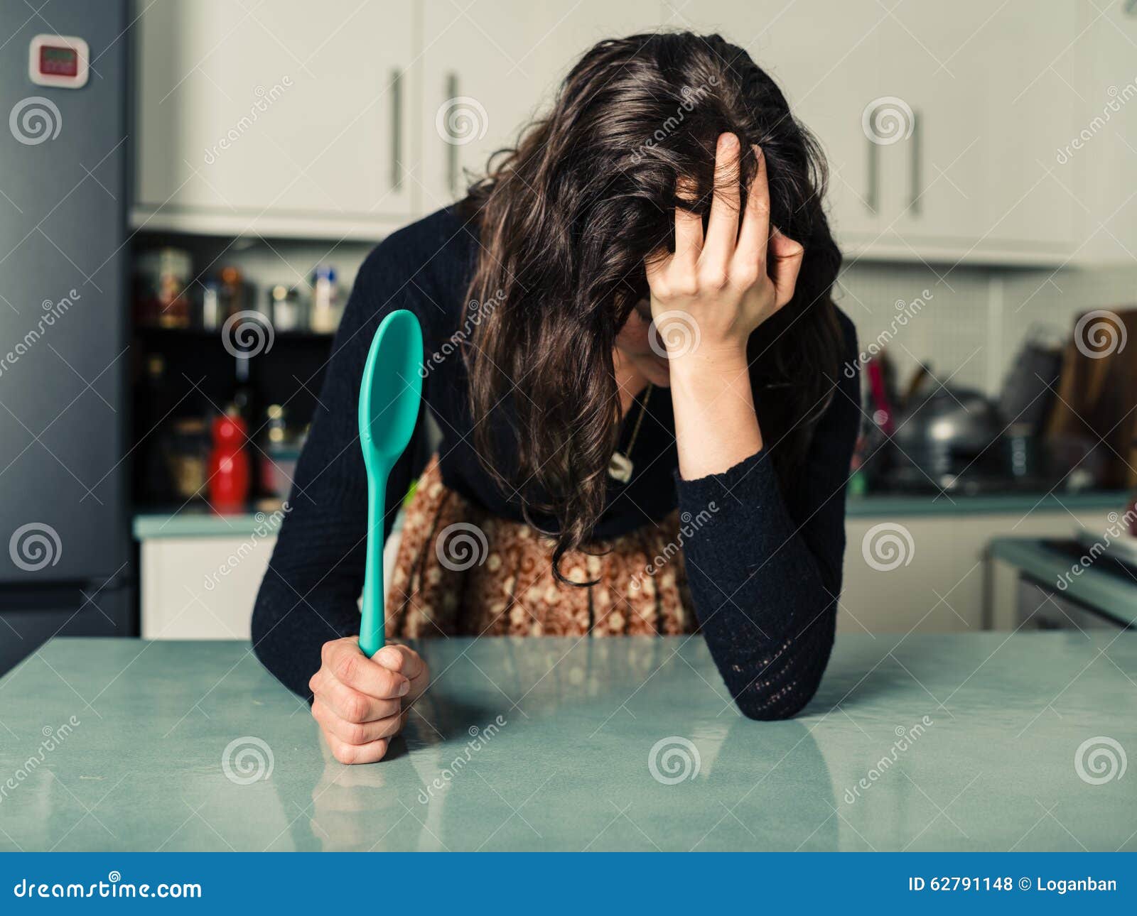 Sad Woman with Spoon in Kitchen Stock Photo - Image of food, lifestyle ...