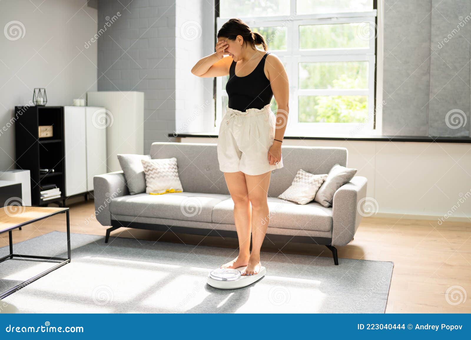 Sad Woman on Weight Scale after Diet Stock Photo - Image of stress ...