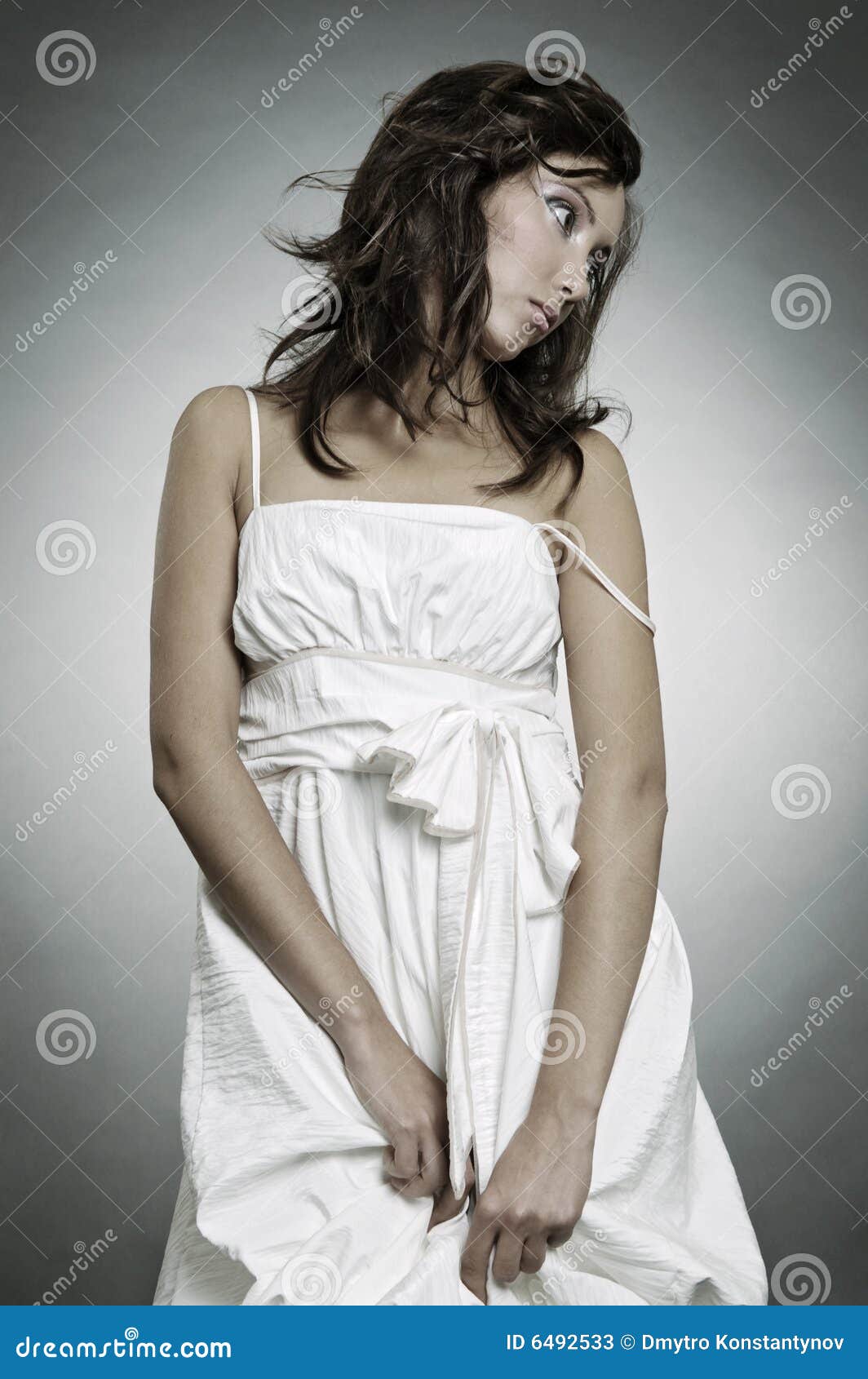 Sad Woman In White Dress