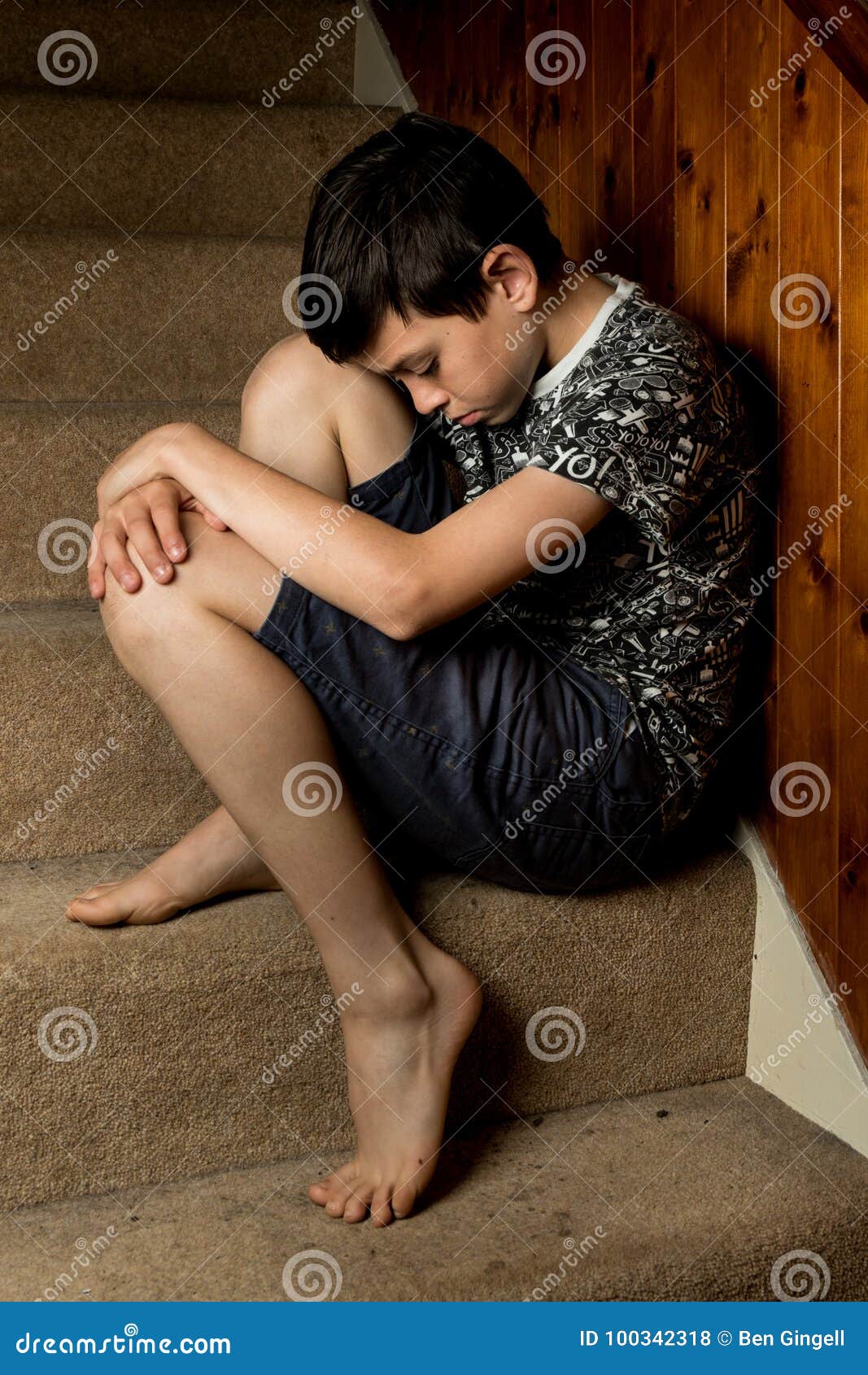 Sad young boy stock photo. Image of teenager, depressed - 100342318