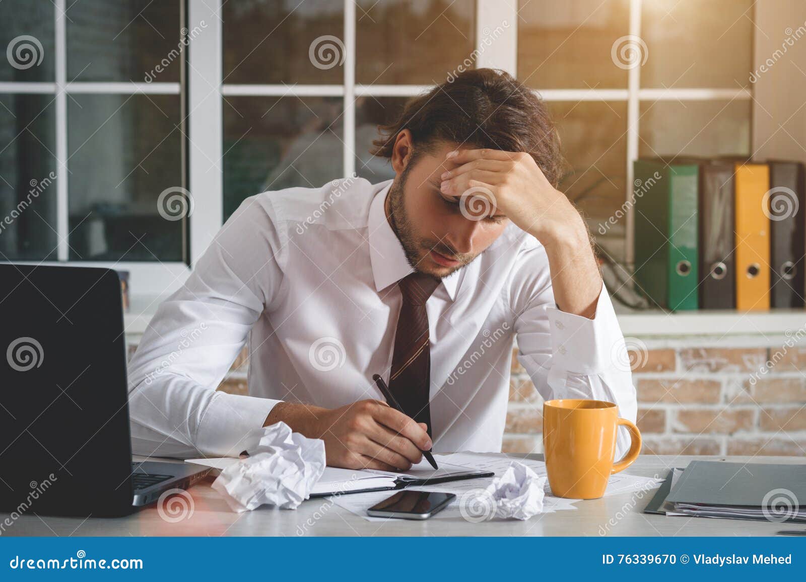 Sad Young Businessman stock photo. Image of room, lifestyle - 76339670