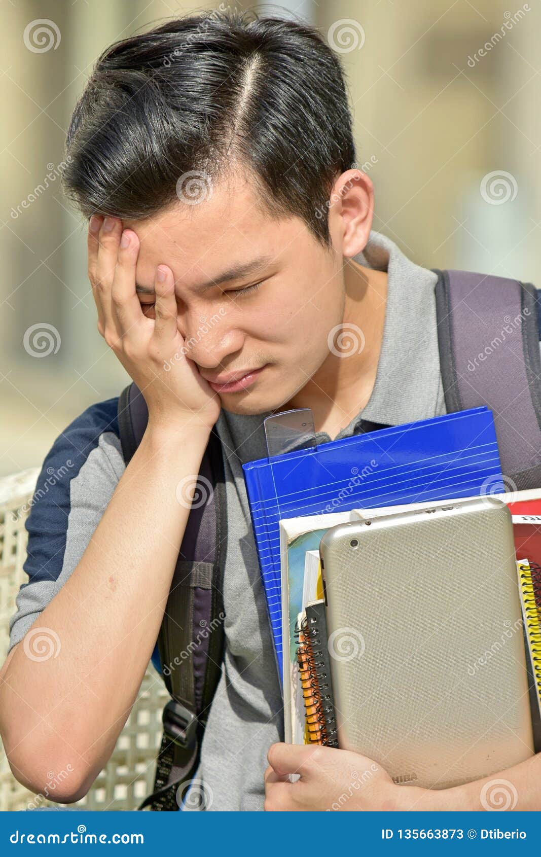 Sad Young Chinese Person stock image. Image of youthful - 135663873