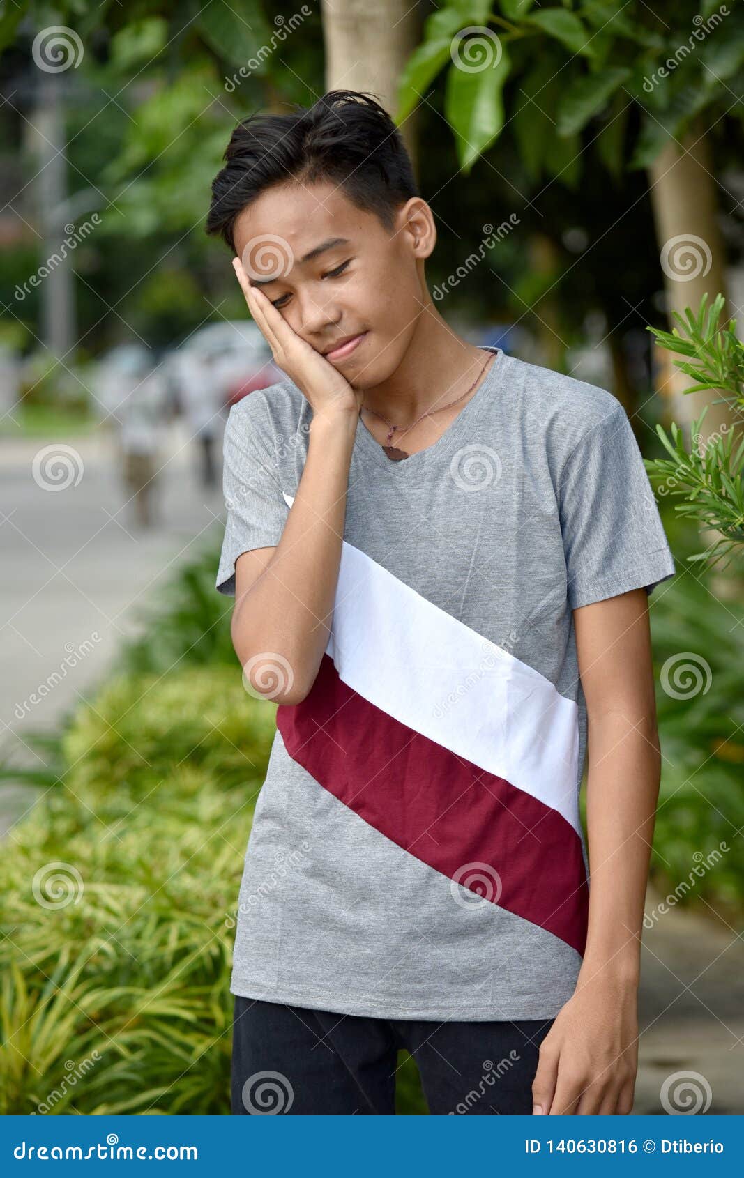 Sad Young Filipino Youth stock photo. Image of feelings - 140630816