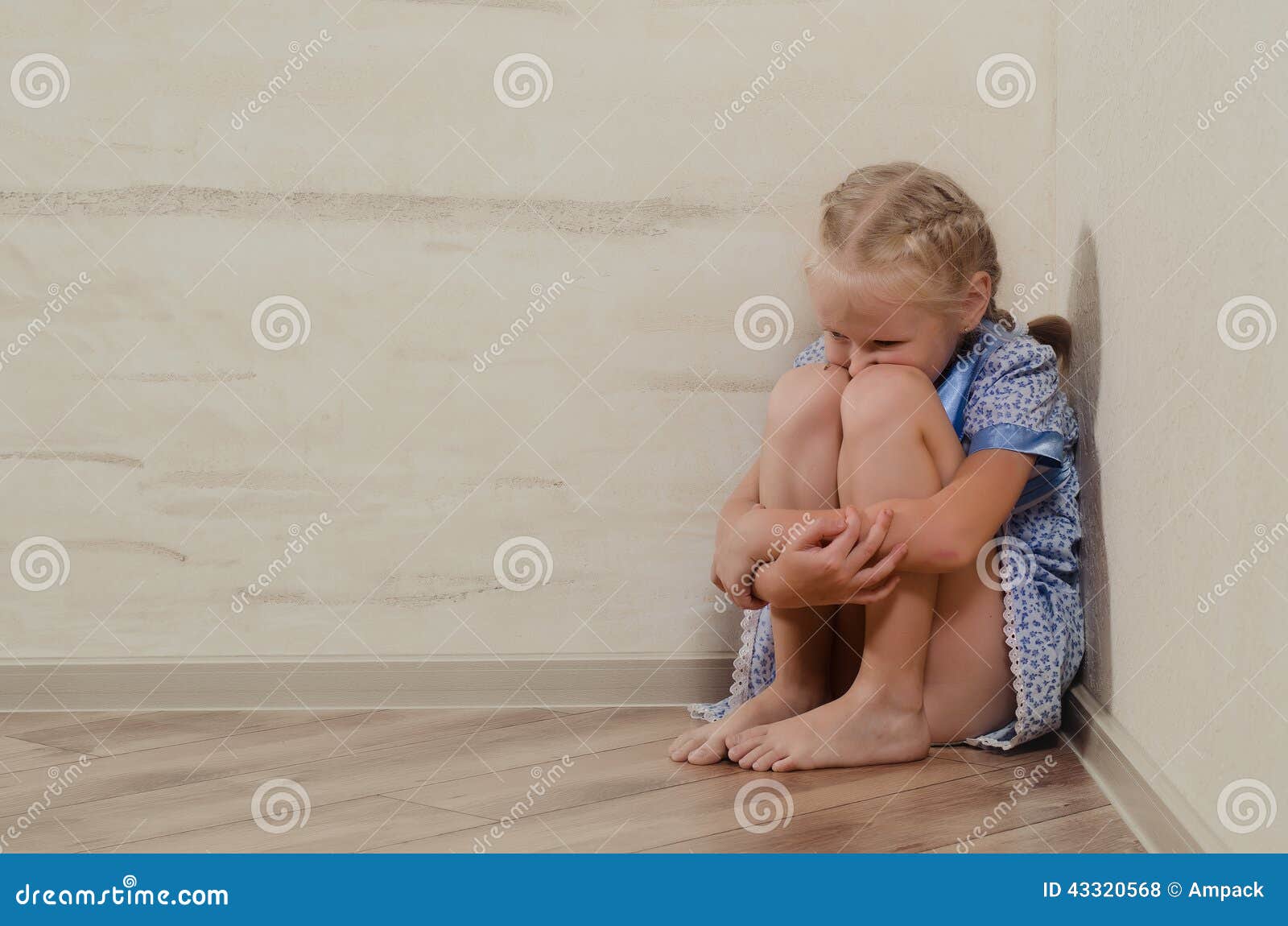 Sad Young Girl Sitting in Corner Stock Photo - Image of anxious, moody ...