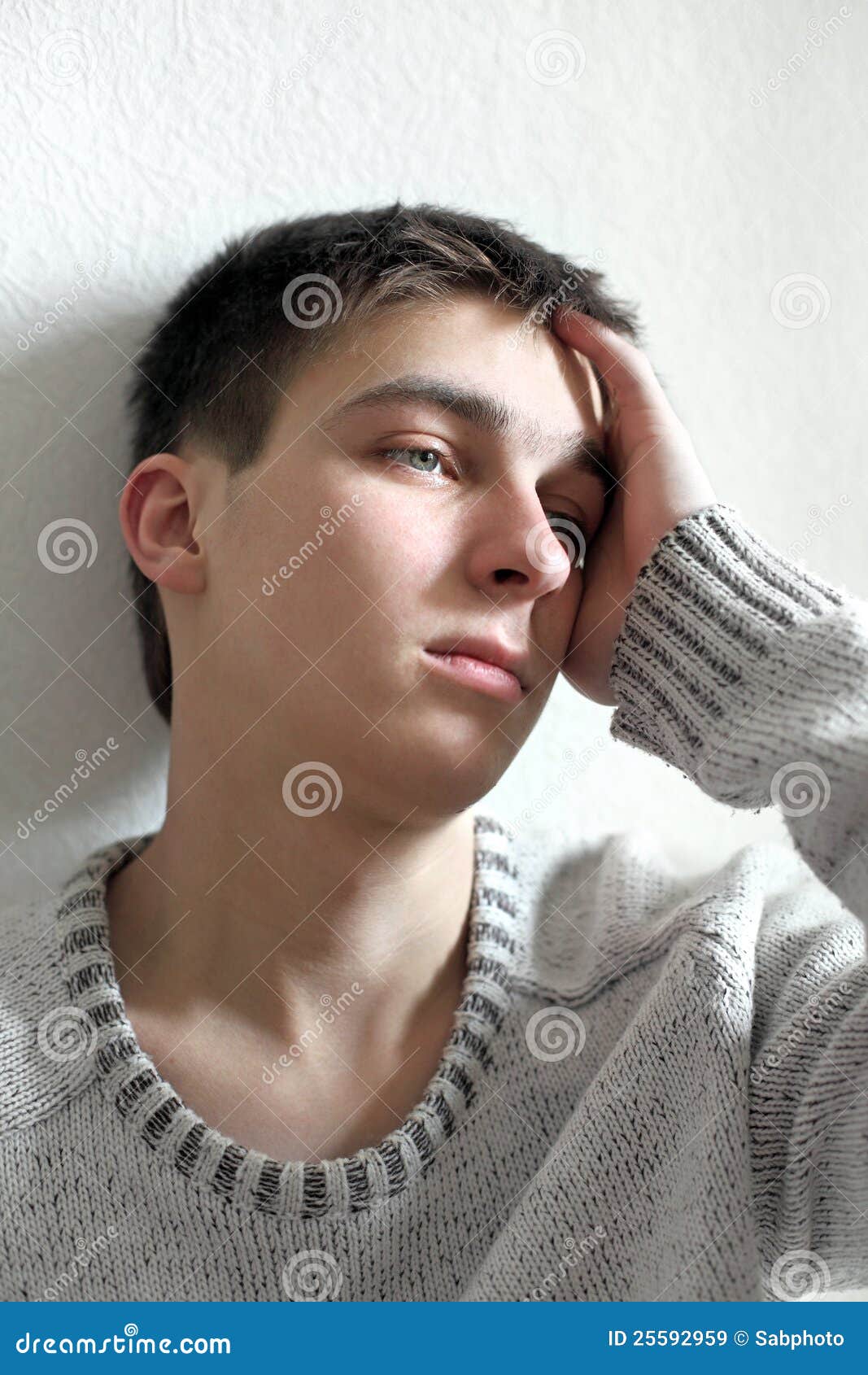 Sad young man stock image. Image of face, sorrow, wall - 25592959