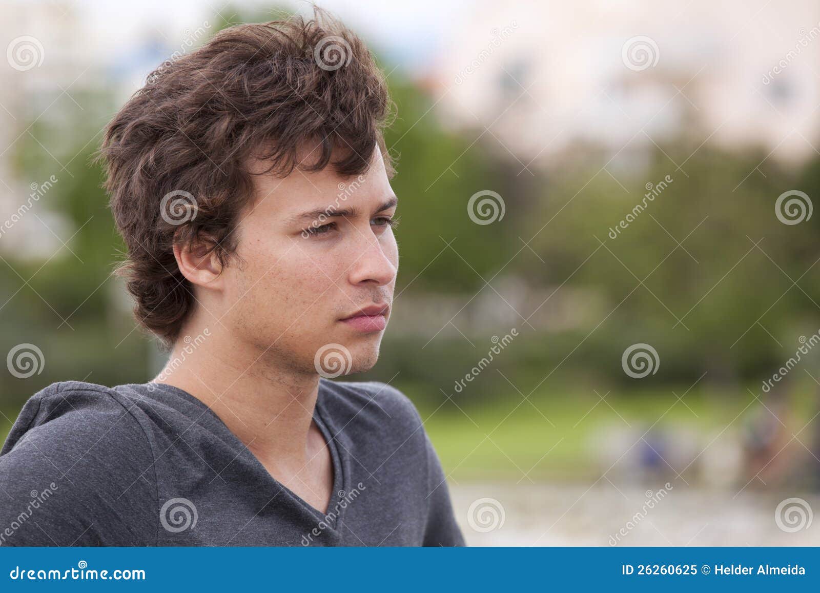 Sad young man stock image. Image of emotion, looking - 26260625