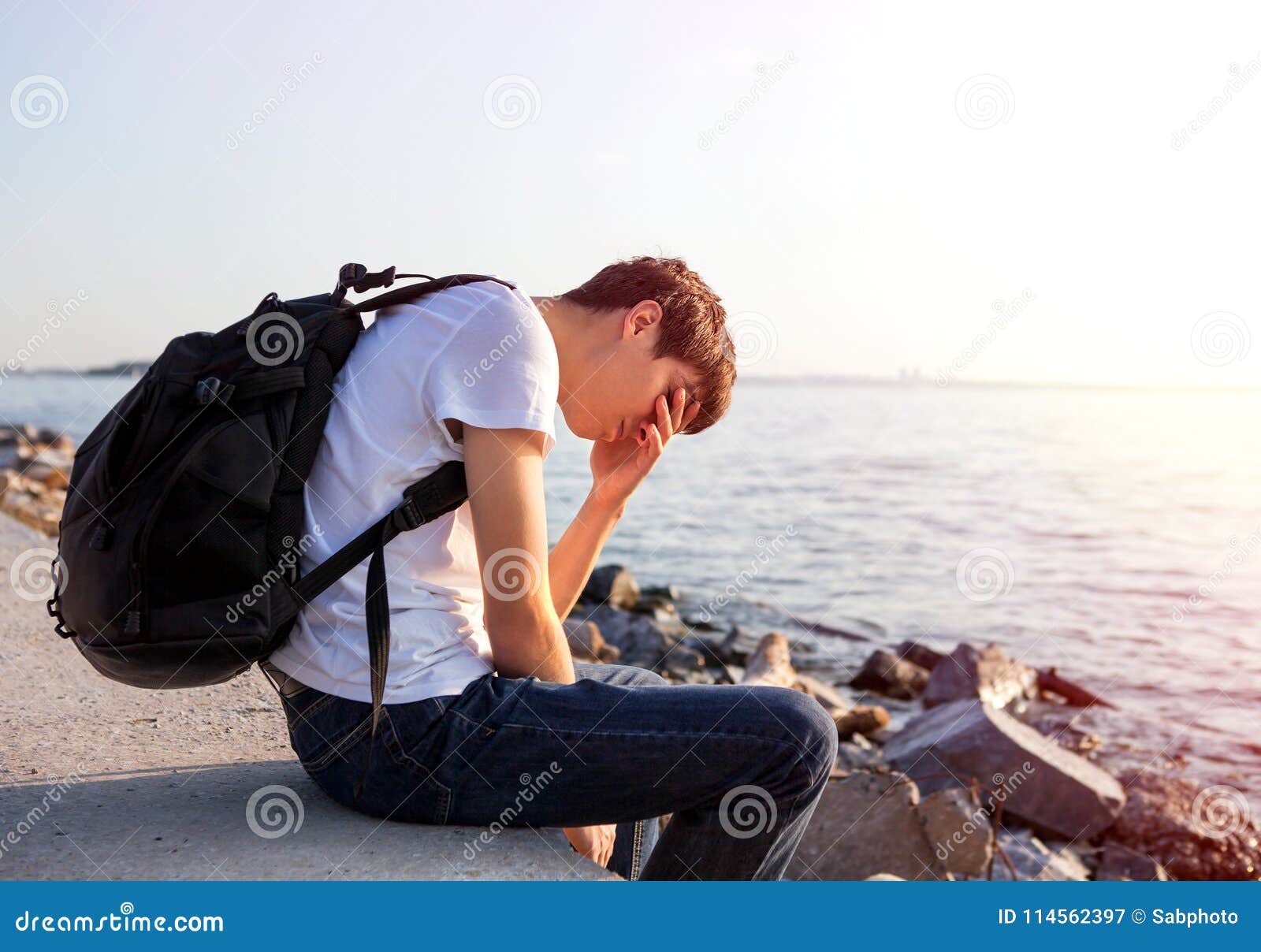 Sad Young Man stock image. Image of sunlight, problem - 114562397
